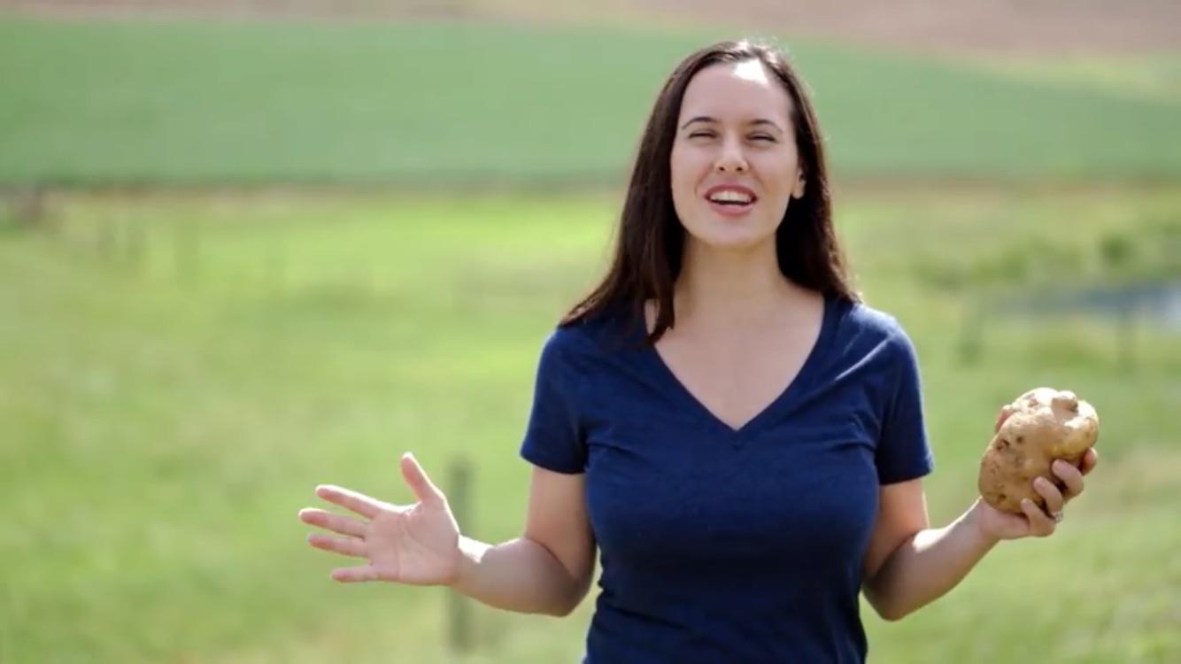 Lady holding potato | Scrolller