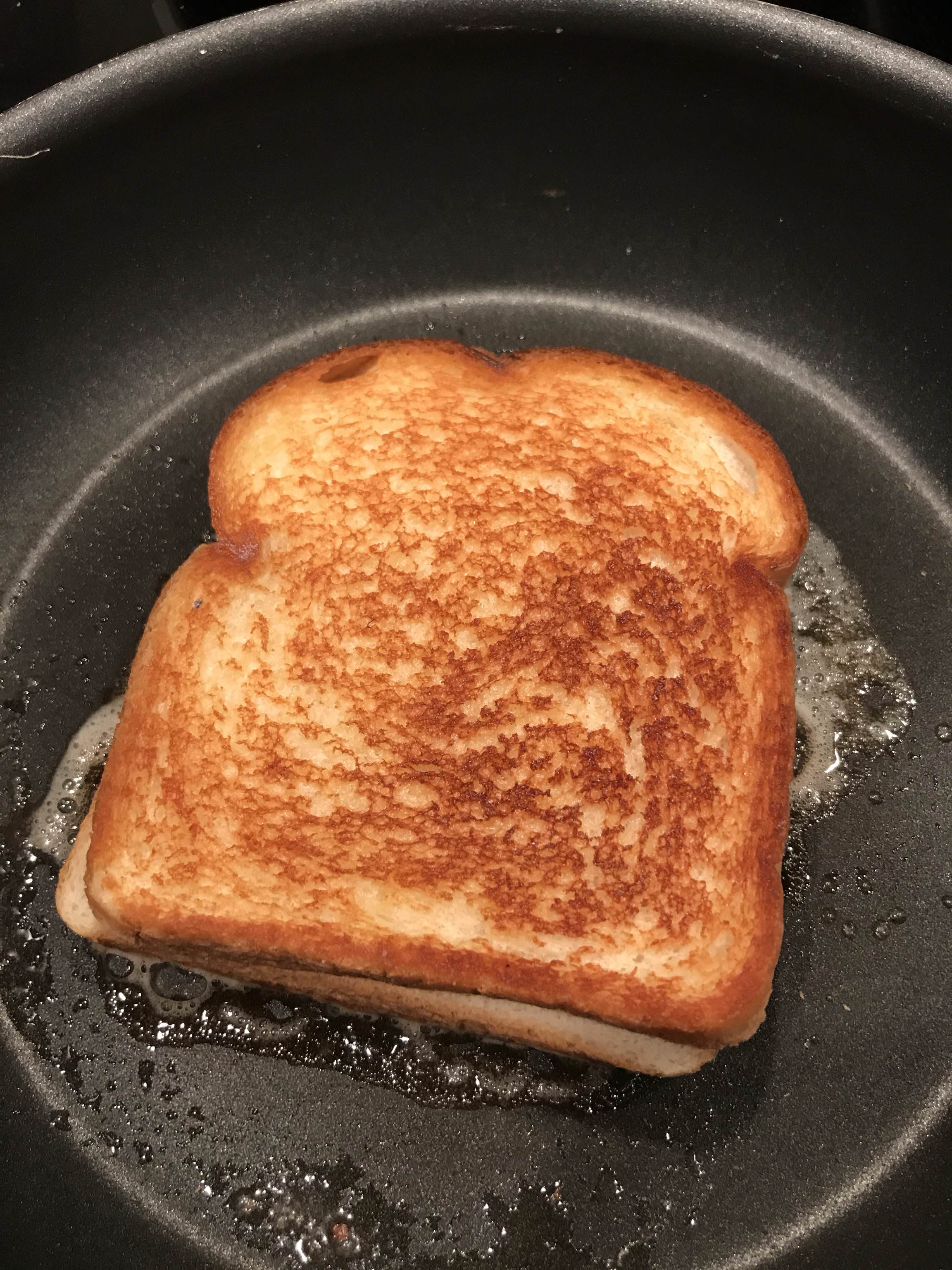 Late night grilled cheese in process | Scrolller