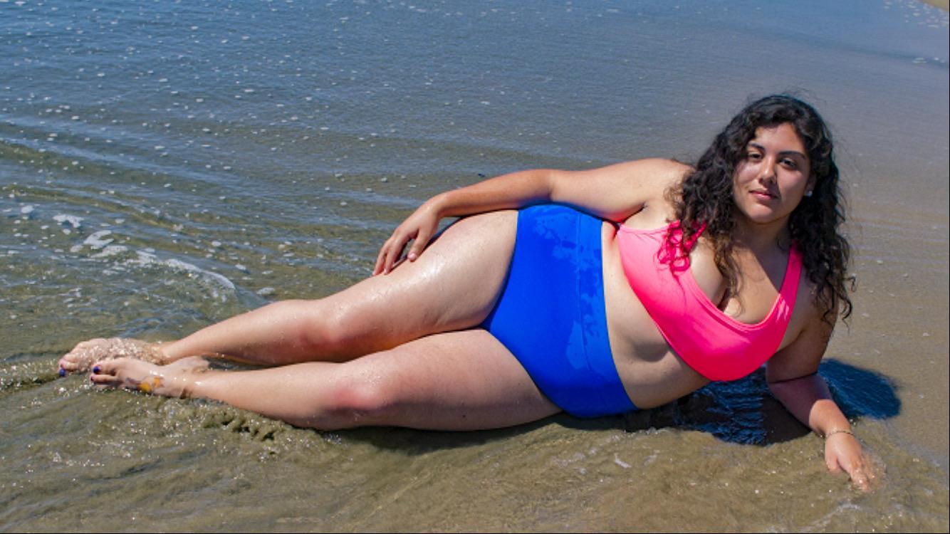 Lounging in wet sand | Scrolller