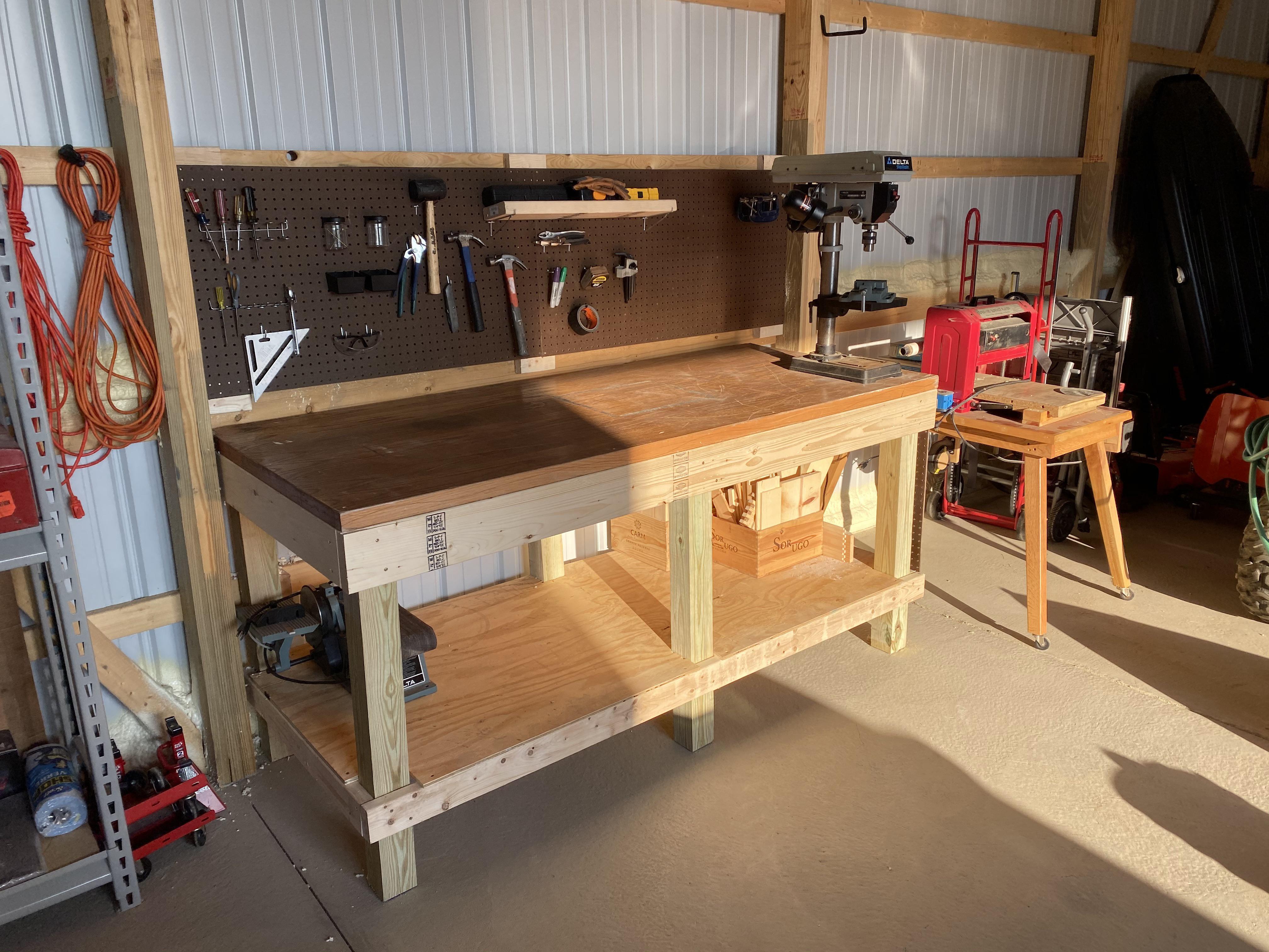 Made my first workbench from an old door I had laying around | Scrolller