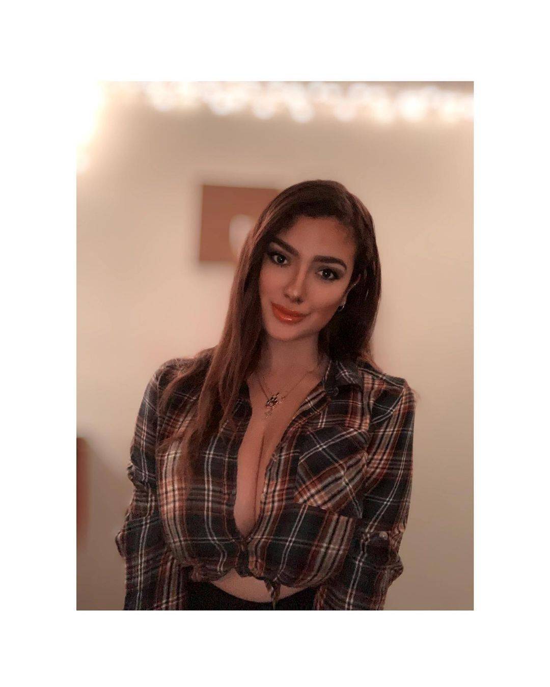 Mega cleavage in plaid | Scrolller