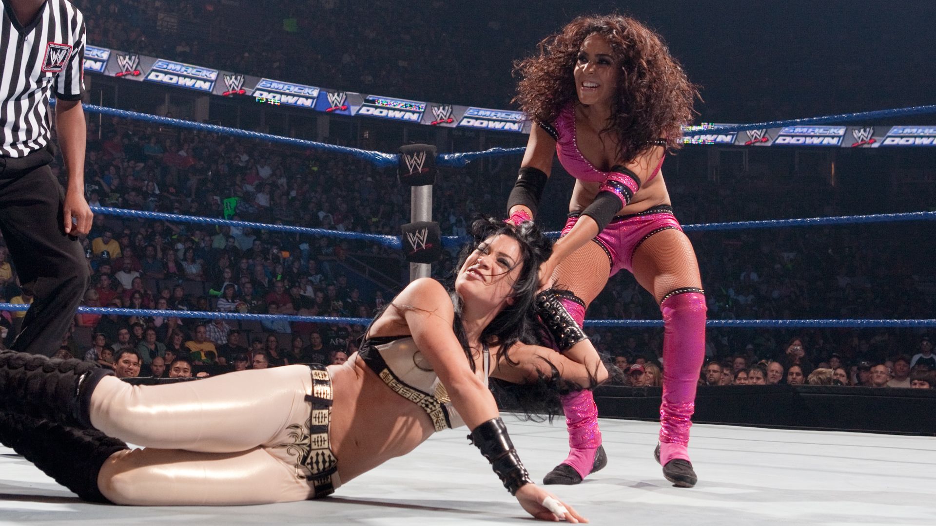 Melina getting dragged around by her hair | Scrolller