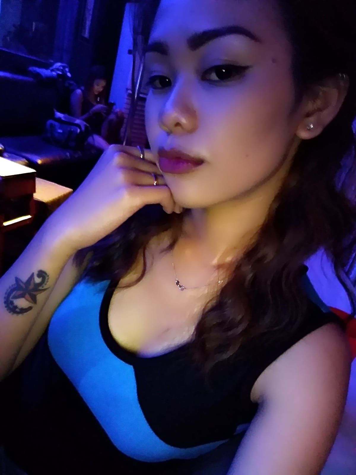 Mia in her karaoke room in Angeles City | Scrolller