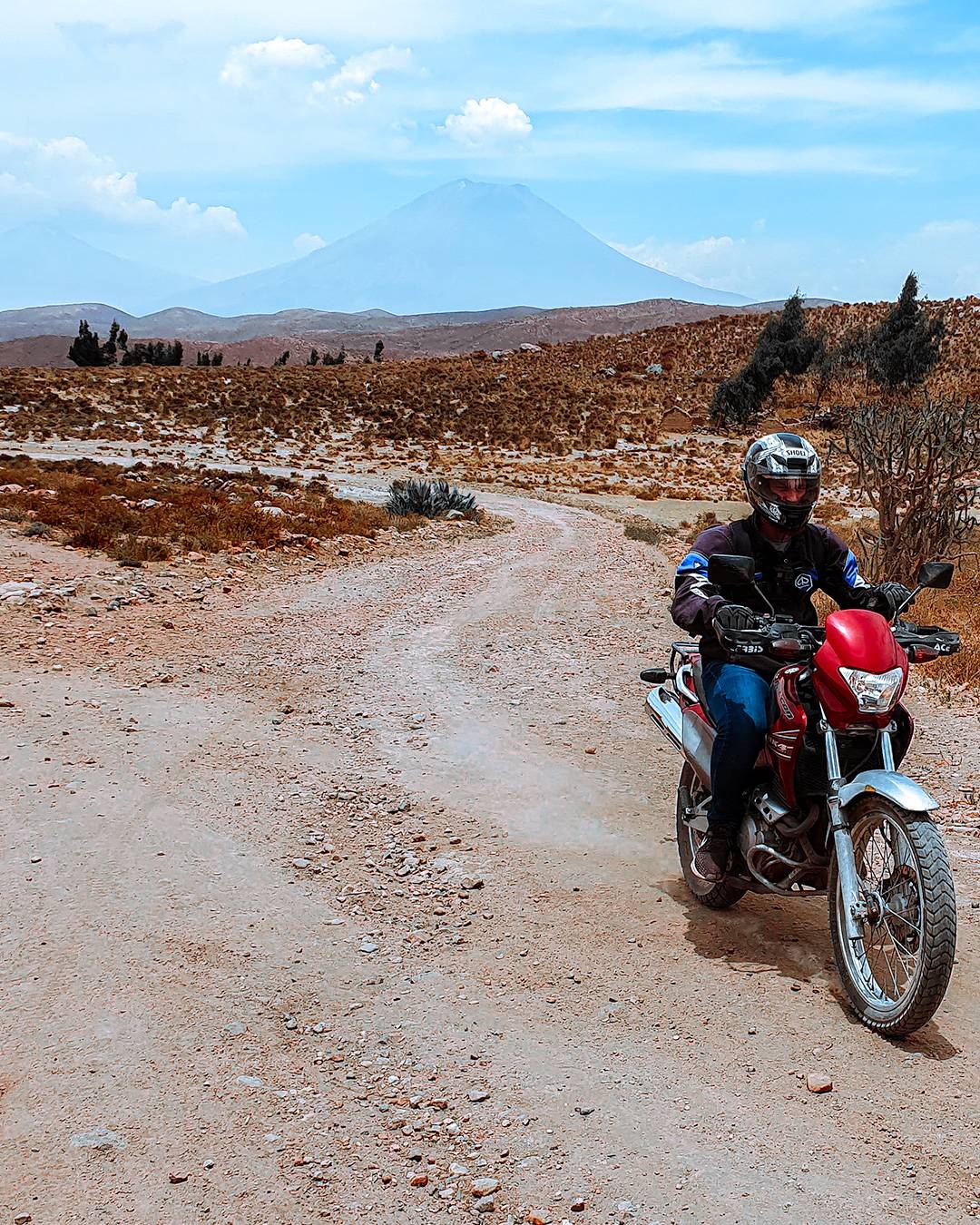 Motorbiking in Arequipa, Peru - Volcan Misti behind | Scrolller