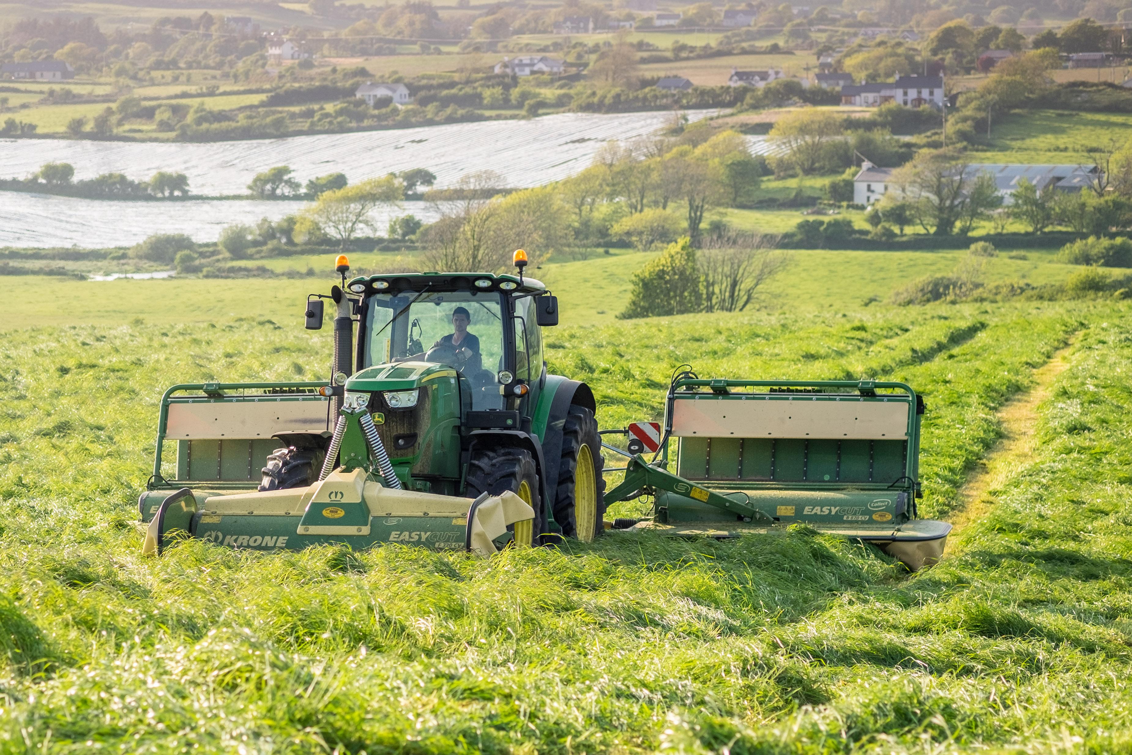 Mowing silage with a John Deere 6190r and Krone butterfly mowers in West Cork, Ireland ...