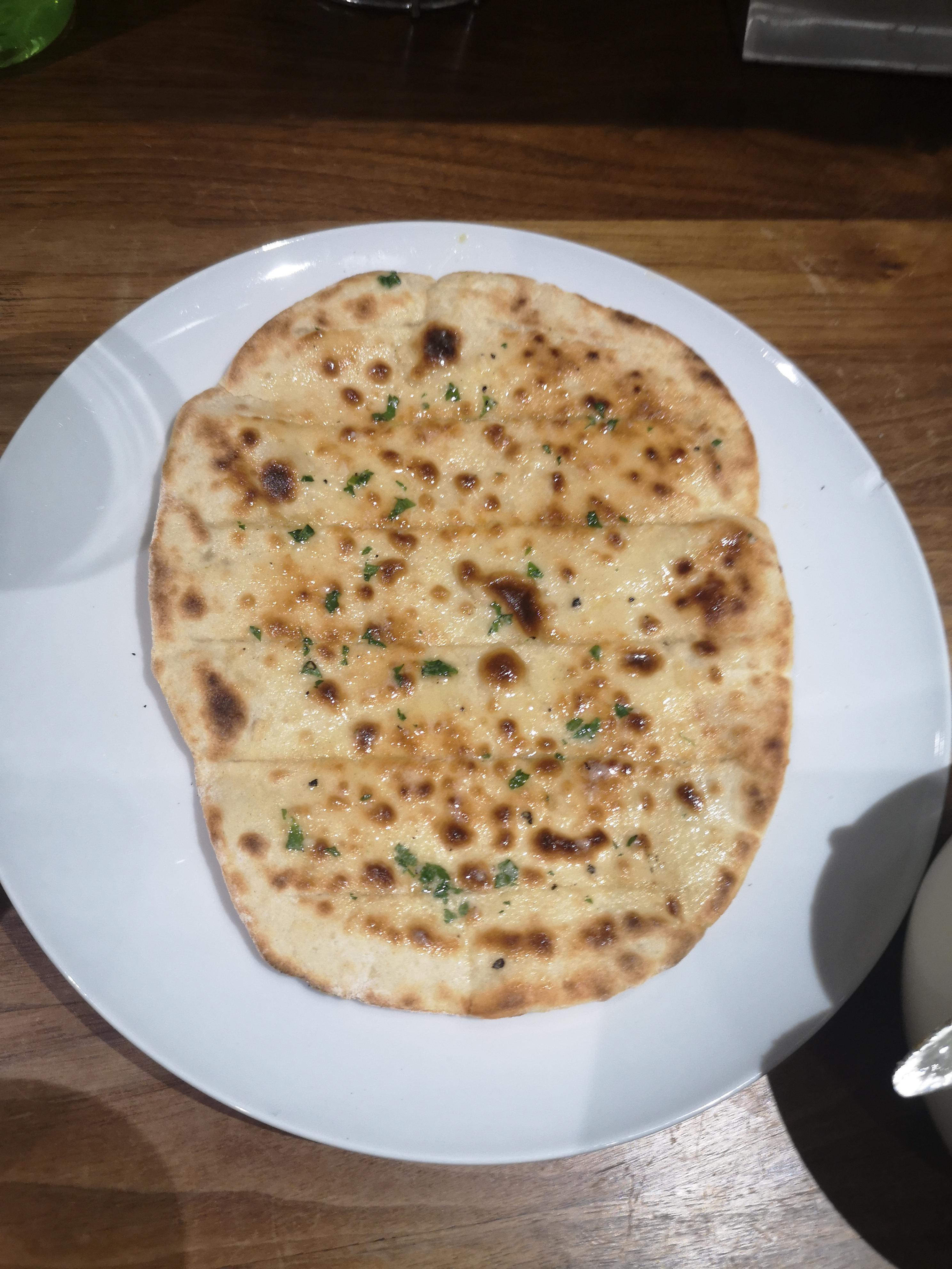My first time making garlic naan bread | Scrolller