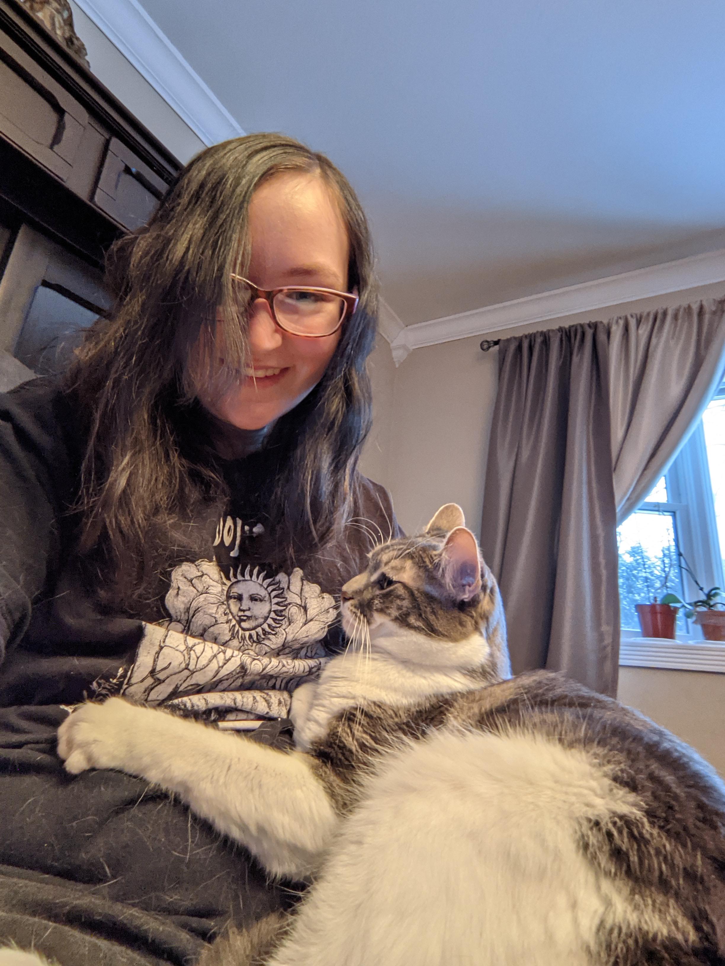 My friend 30 seconds before this picture: "He isn't a cuddly cat- wow he never does that ...