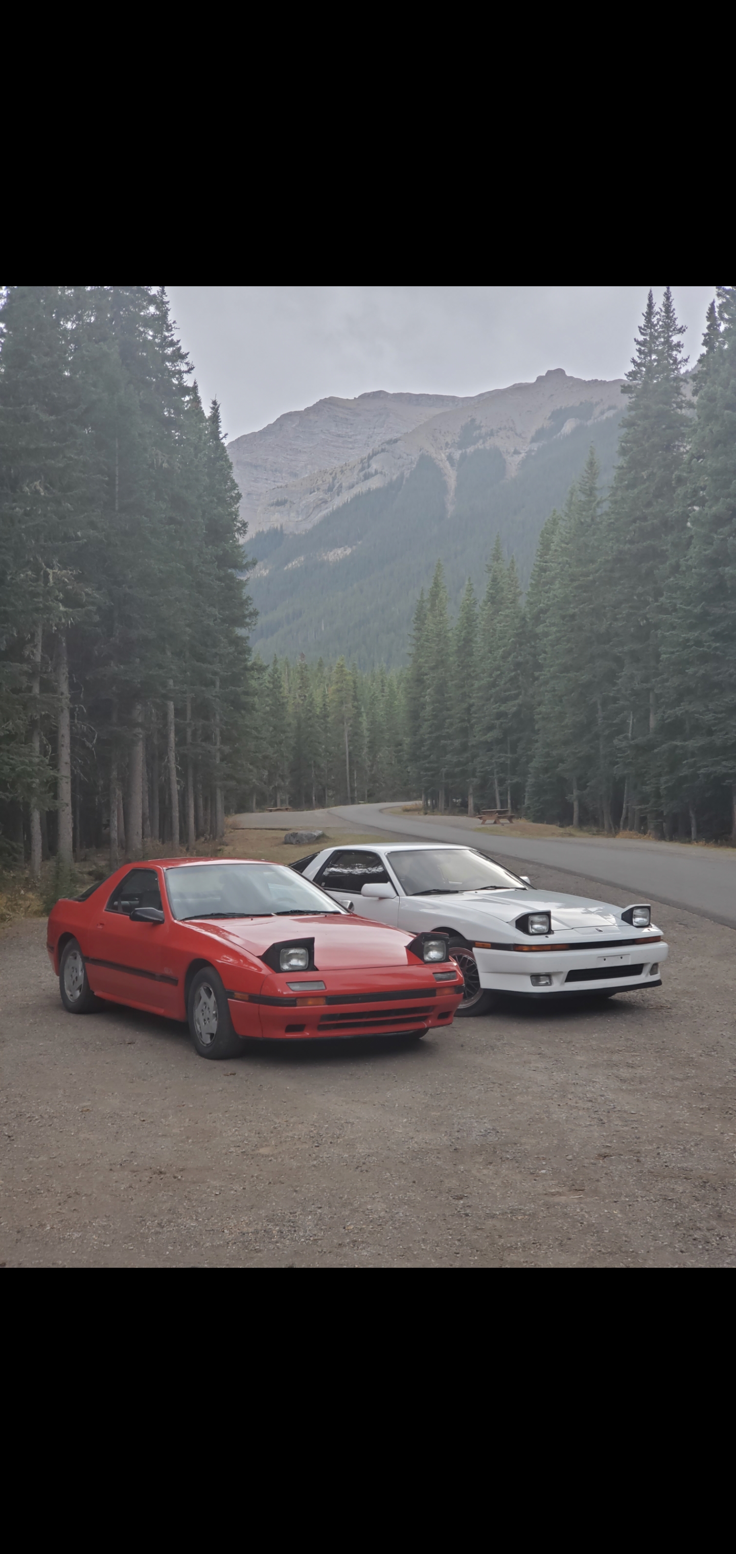 My friends supra and my rx7 on a mountain pass. (Alberta Canada) | Scrolller