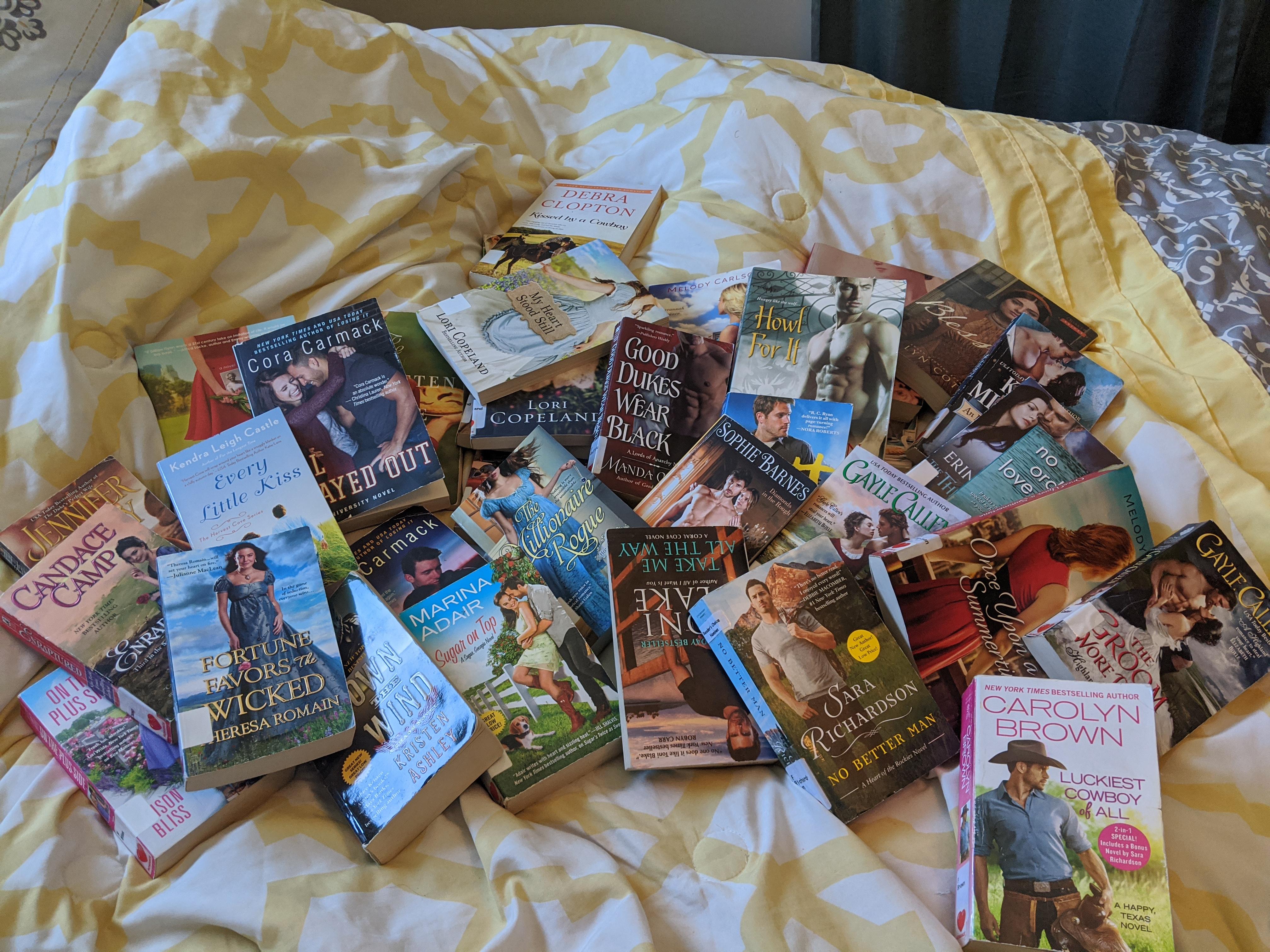 My library finally opened up, and they were selling 'grab boxes' of romance novels. 35 BOOKS FOR ...