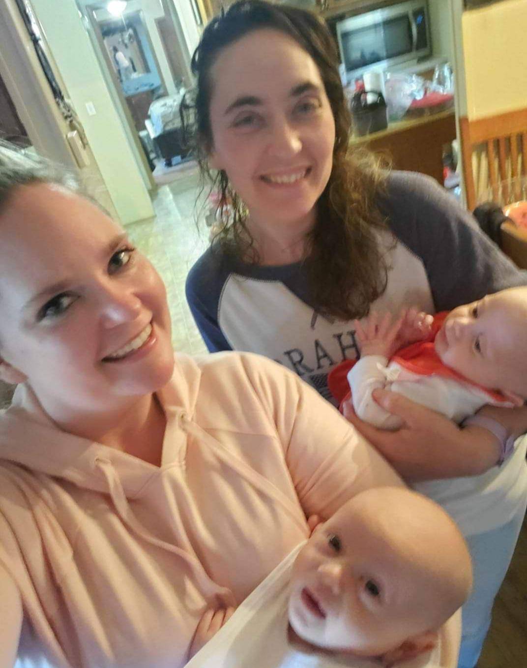 My Twin Sister And I Holding Our Twin Nephews Scrolller