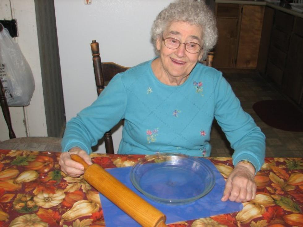 Nana grabs a handful of wood and shows her gaping pie hole. | Scrolller