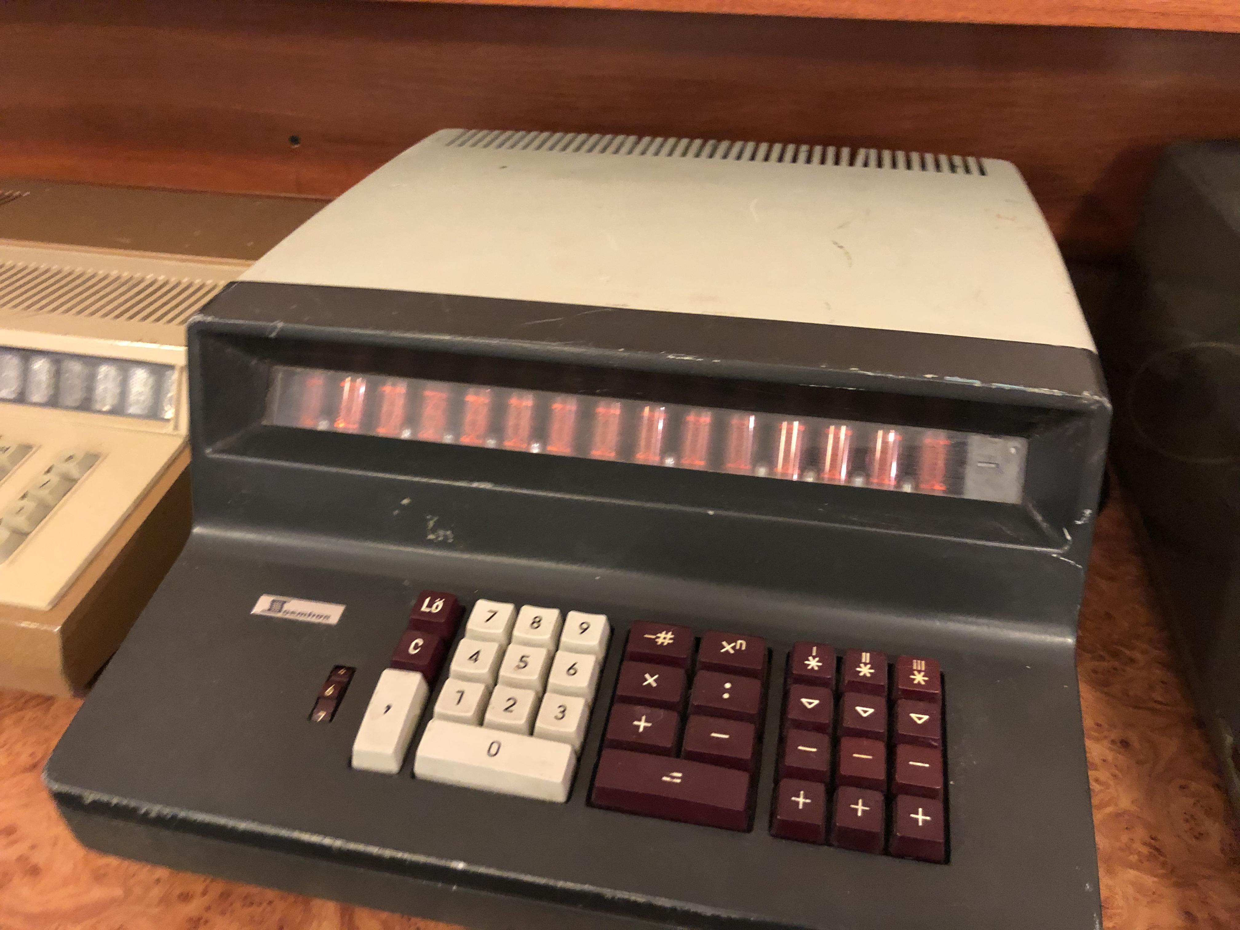 Nixie tube calculator | Scrolller