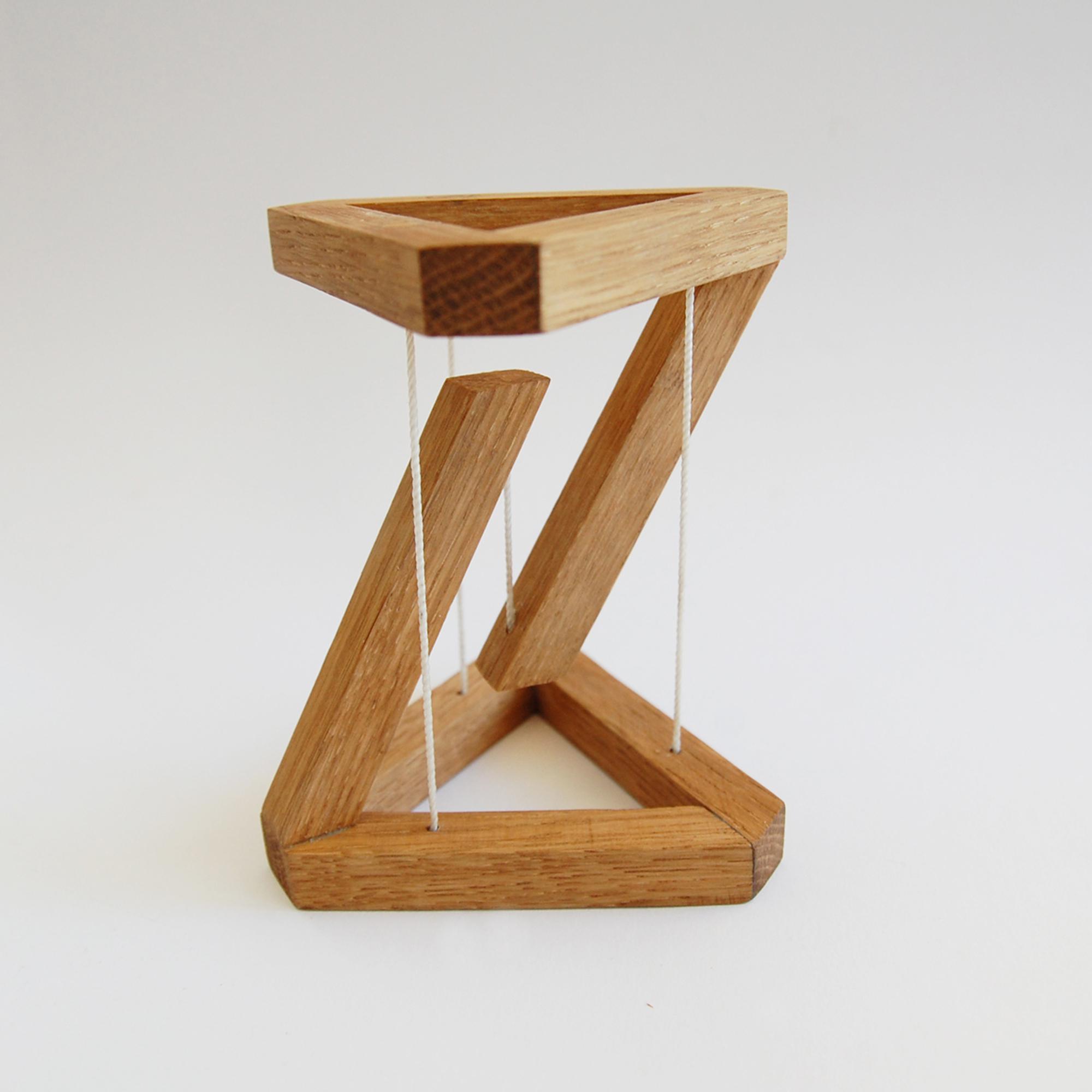 Oak tensegrity! I aligned the strings vertical to enhance the effect! | Scrolller