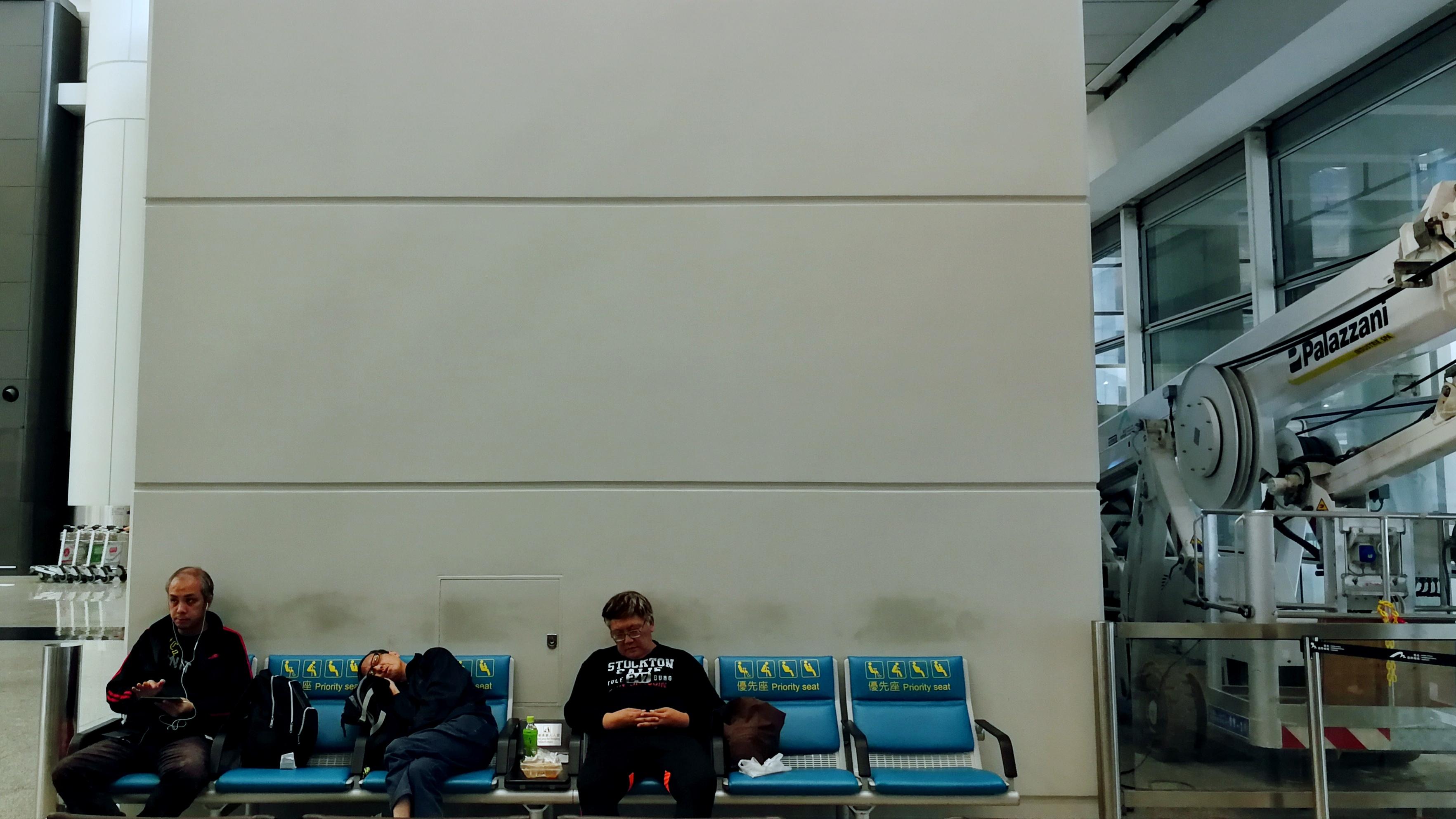 Oily wall behind an airport bench | Scrolller