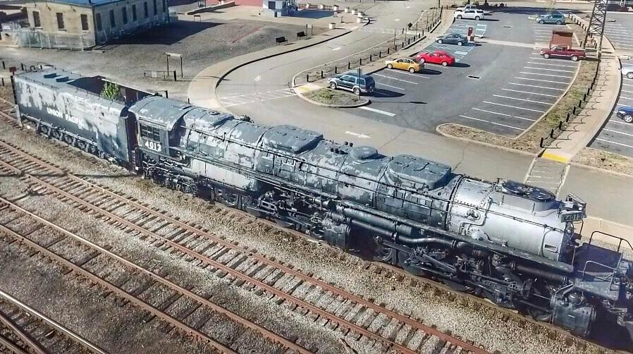 One of the largest American steam locomotives , Union Pacific “Big Boy “ . Notice the tree ...