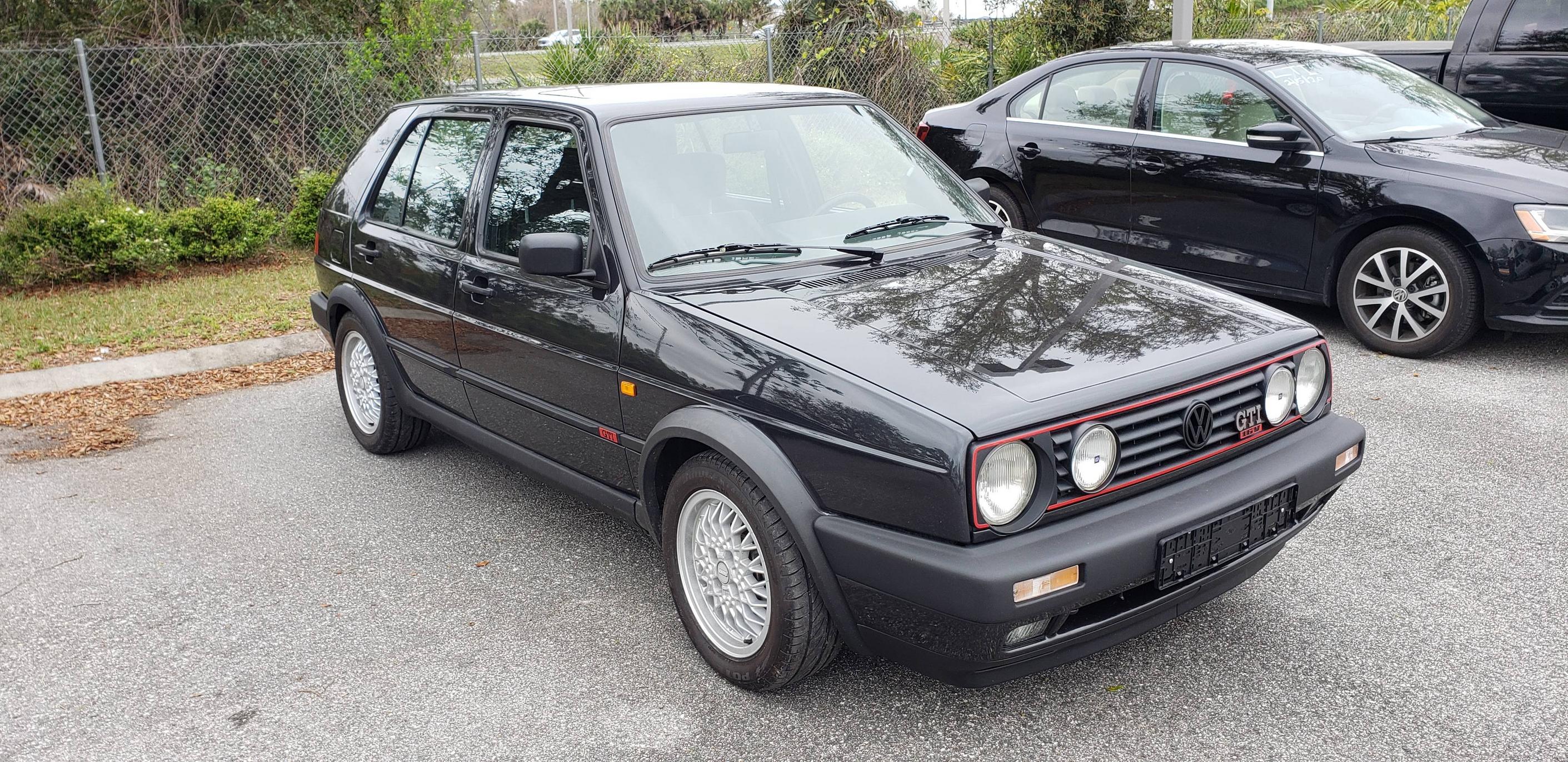 Orlando, FL My friend's freshly imported 1991 4 door MK2 GTI. 1.8l CIS with the 50mm 16v intake ...