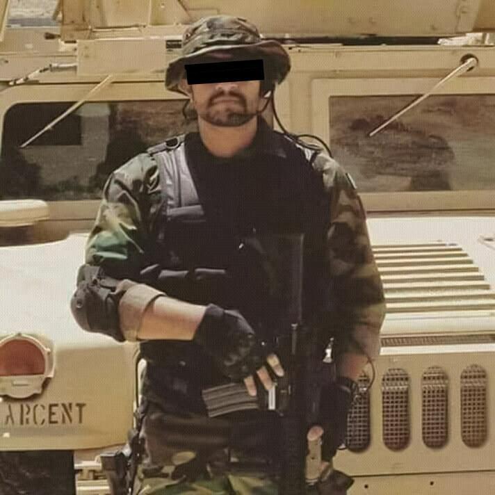 Pakistan army SOF Operator standing in front of HUMVEE captured from Taliban. | Scrolller