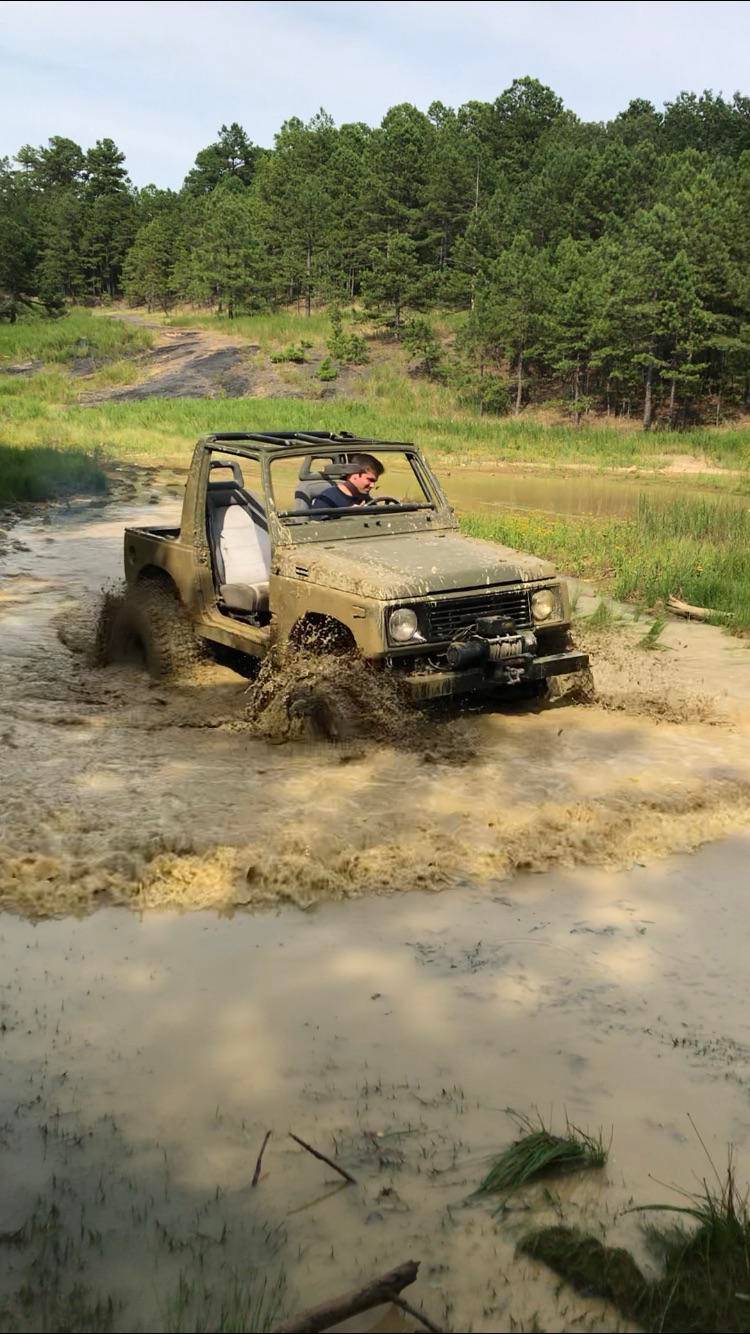 Playing in the mud with my friends Suzuki Samurai | Scrolller