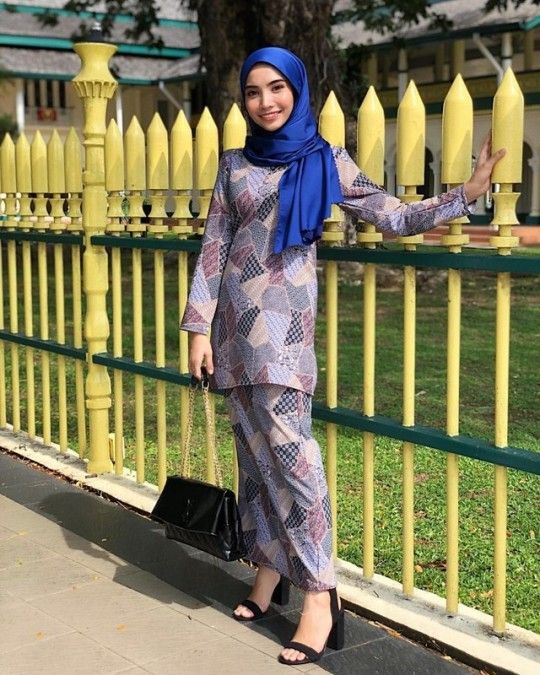 Pretty in her modern traditional dress and heels | Scrolller