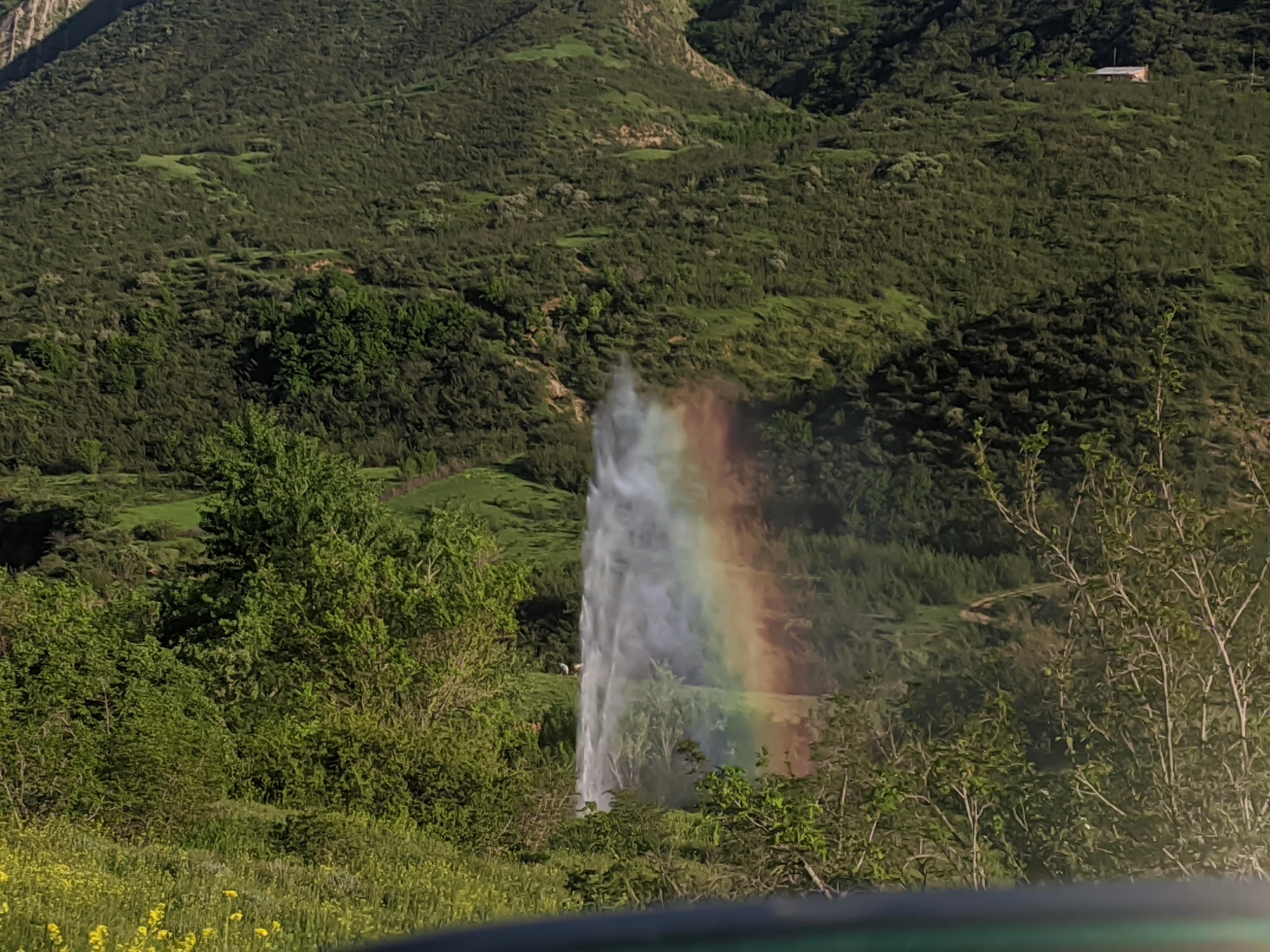 rainbow from a burst pipe | Scrolller