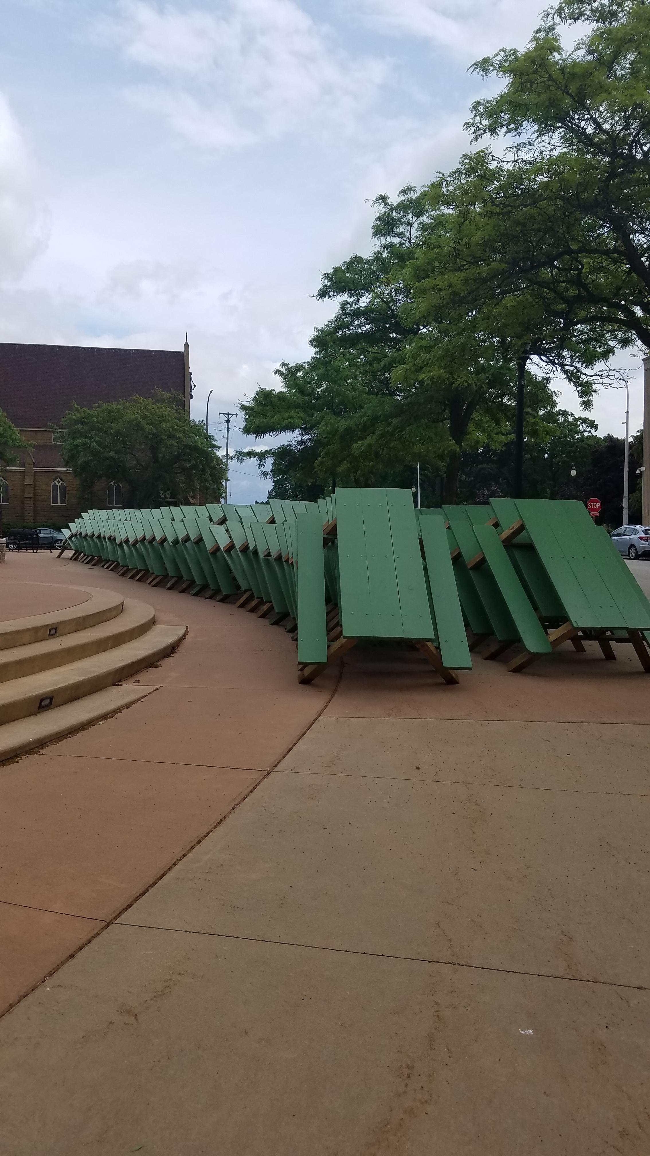 Rare gem! Mating season for picnic benches outside of the culinary institute. | Scrolller