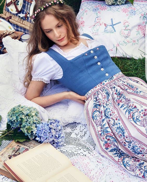 Reading a book in her Dirndl | Scrolller