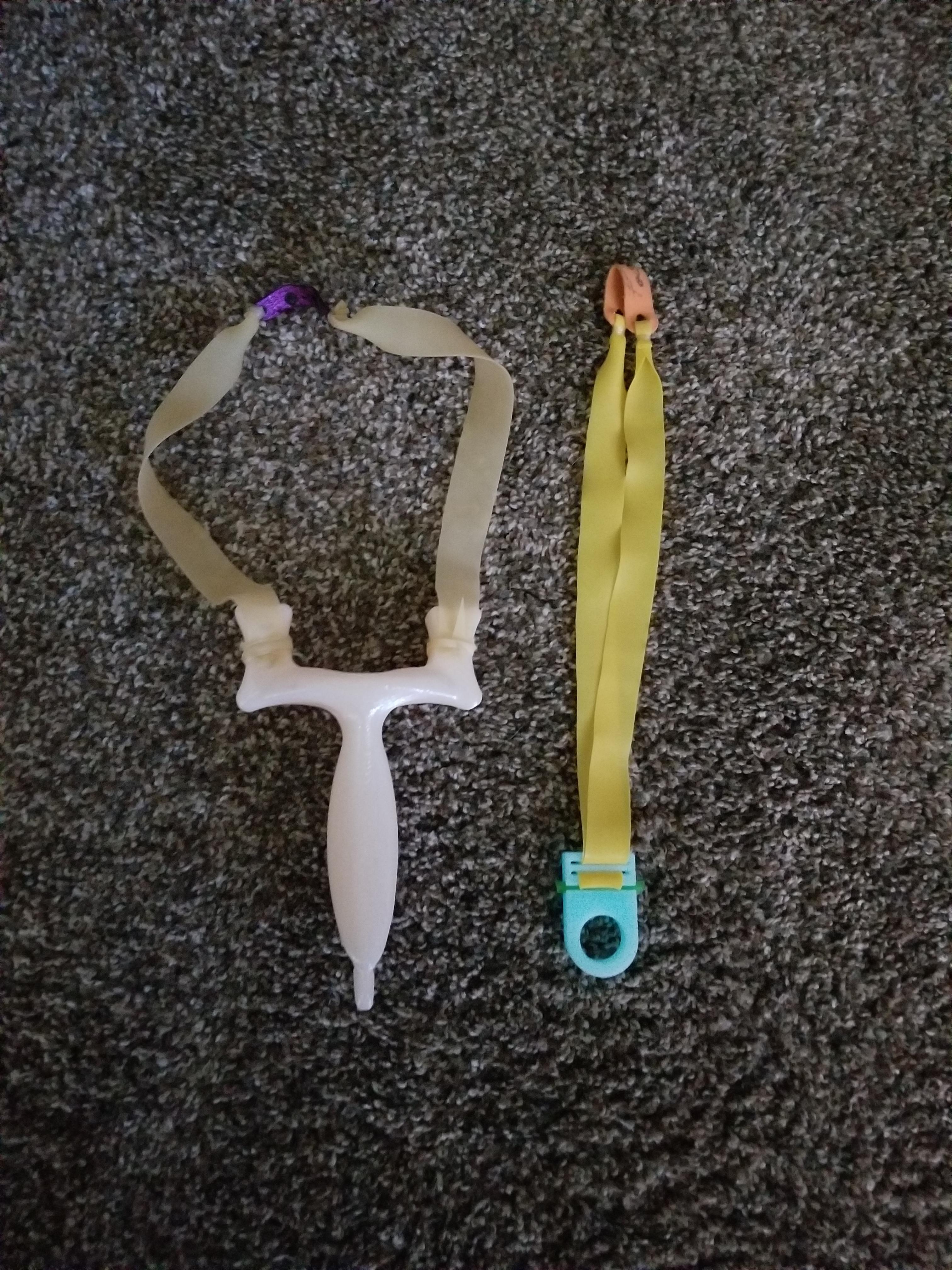 Red and Blue glow in the dark slingshots. | Scrolller