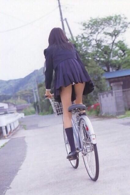 Riding a bike. | Scrolller