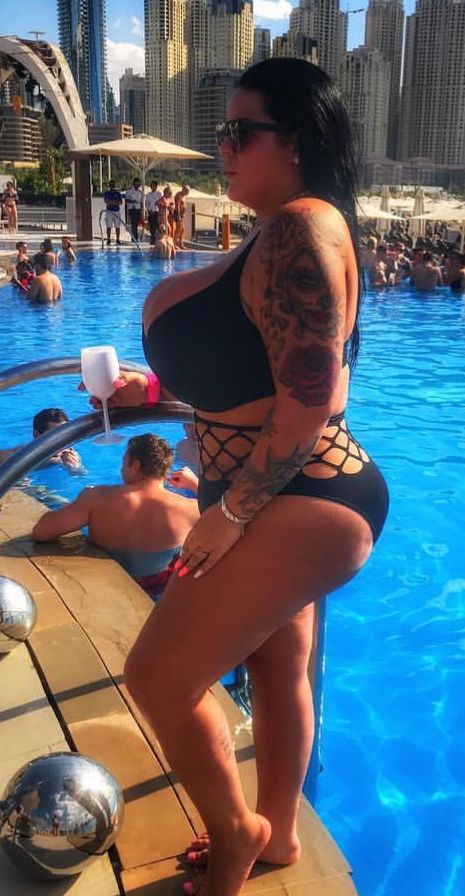 Showing off her impressive curves at the hotel pool | Scrolller