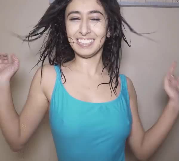 slow-mo shake in loose-fitting swimsuit | Scrolller