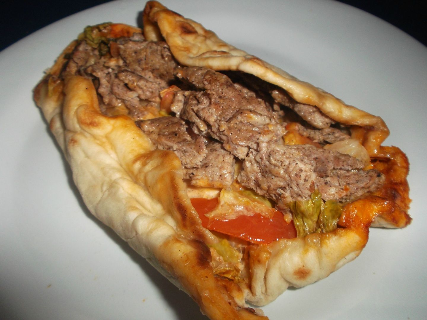 Spicy chicken shawarma from Kabob House | Scrolller