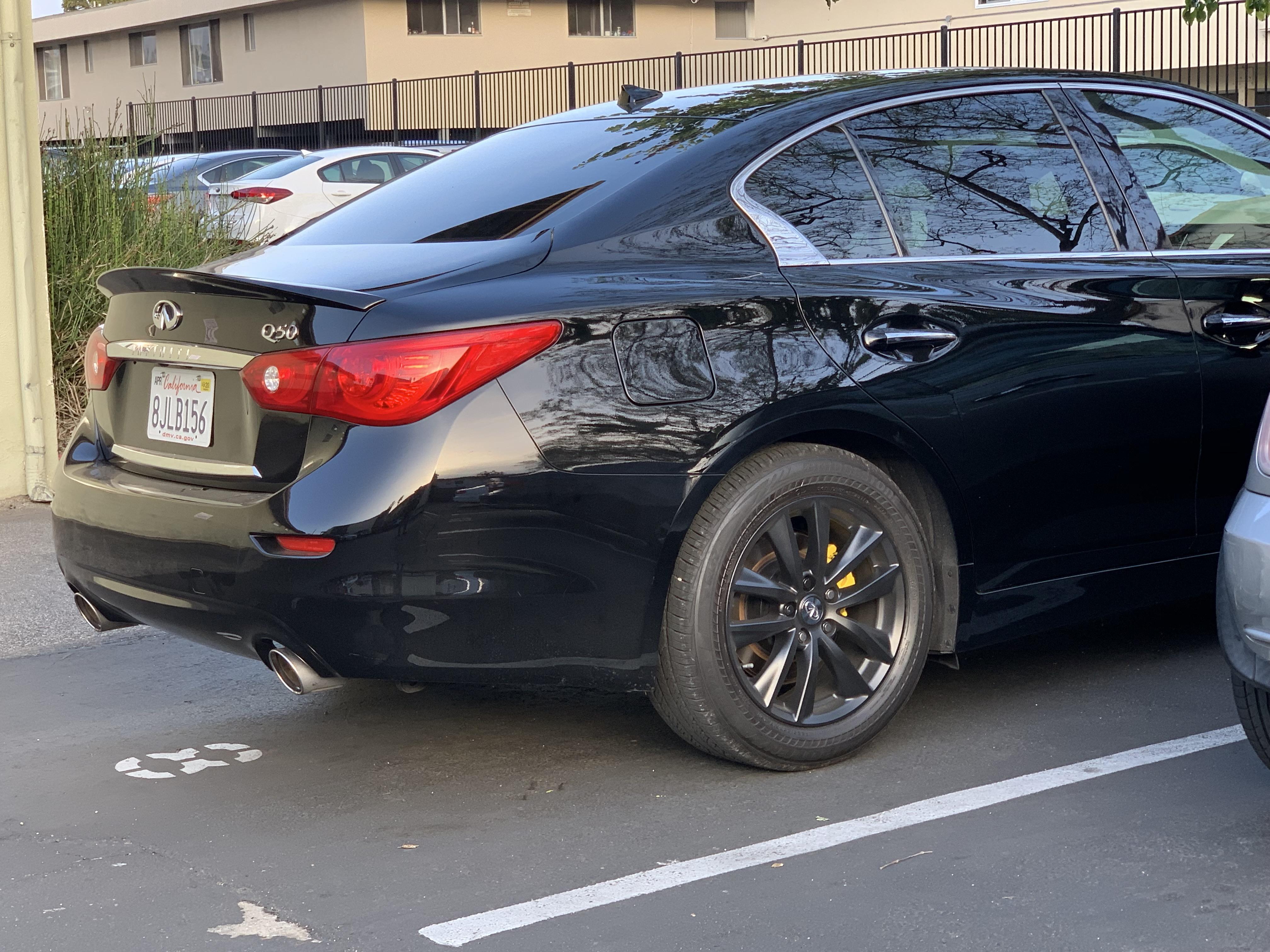 Spoiler added, black plasti-dip wheels, yellow calipers. Chrome trim next 🧐 | Scrolller