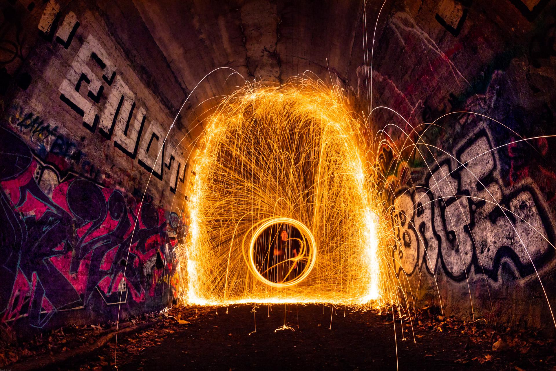 Spun some steel wool in an abandoned train tunnel [1920x1280] [OC] | Scrolller