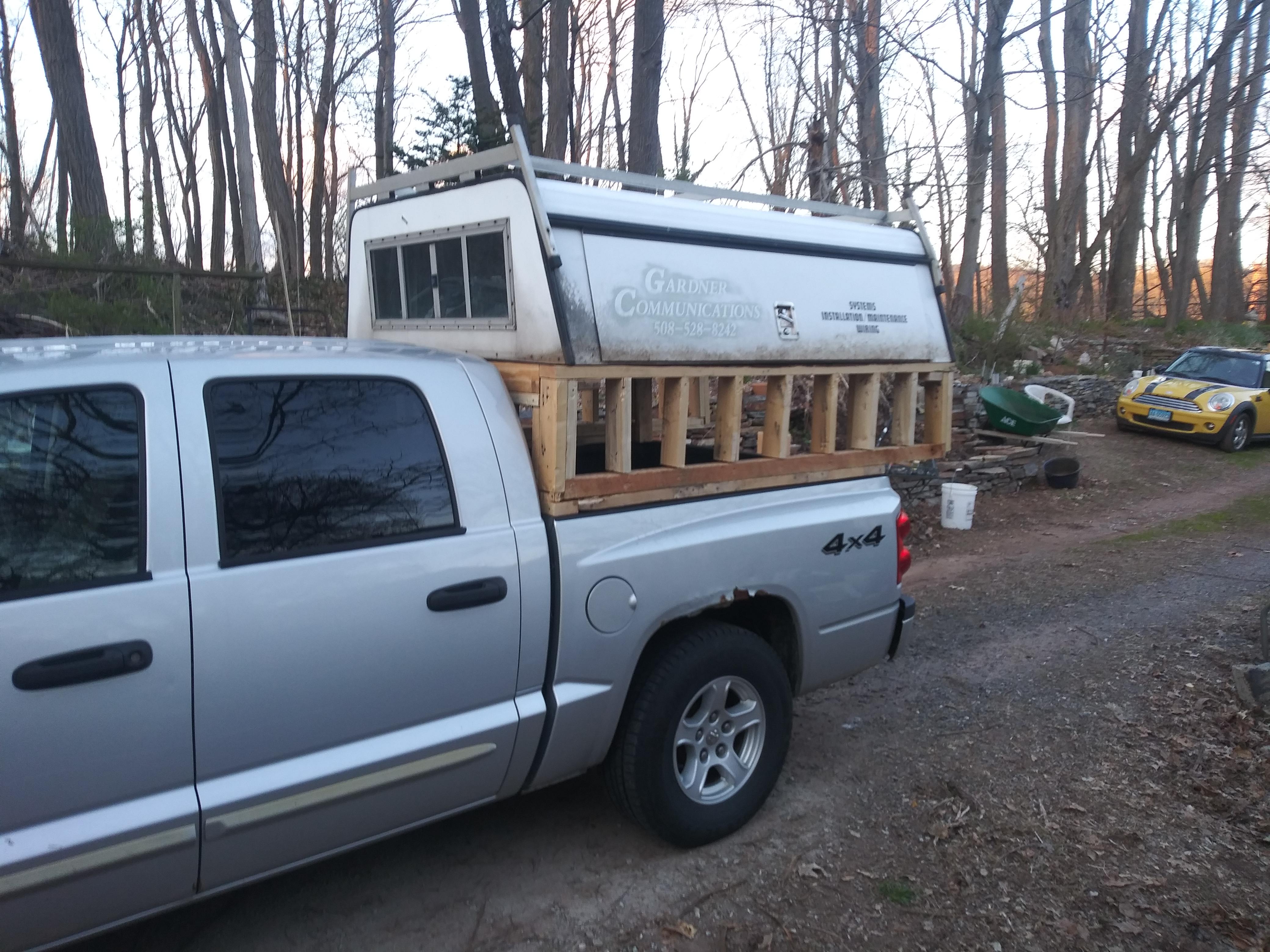 Starting simple with a solid frame - sheathing and building internal bed/table/storage space ...