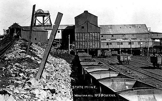 State Mine Station with rail cars ready to collect coal, circa 1919 | Scrolller