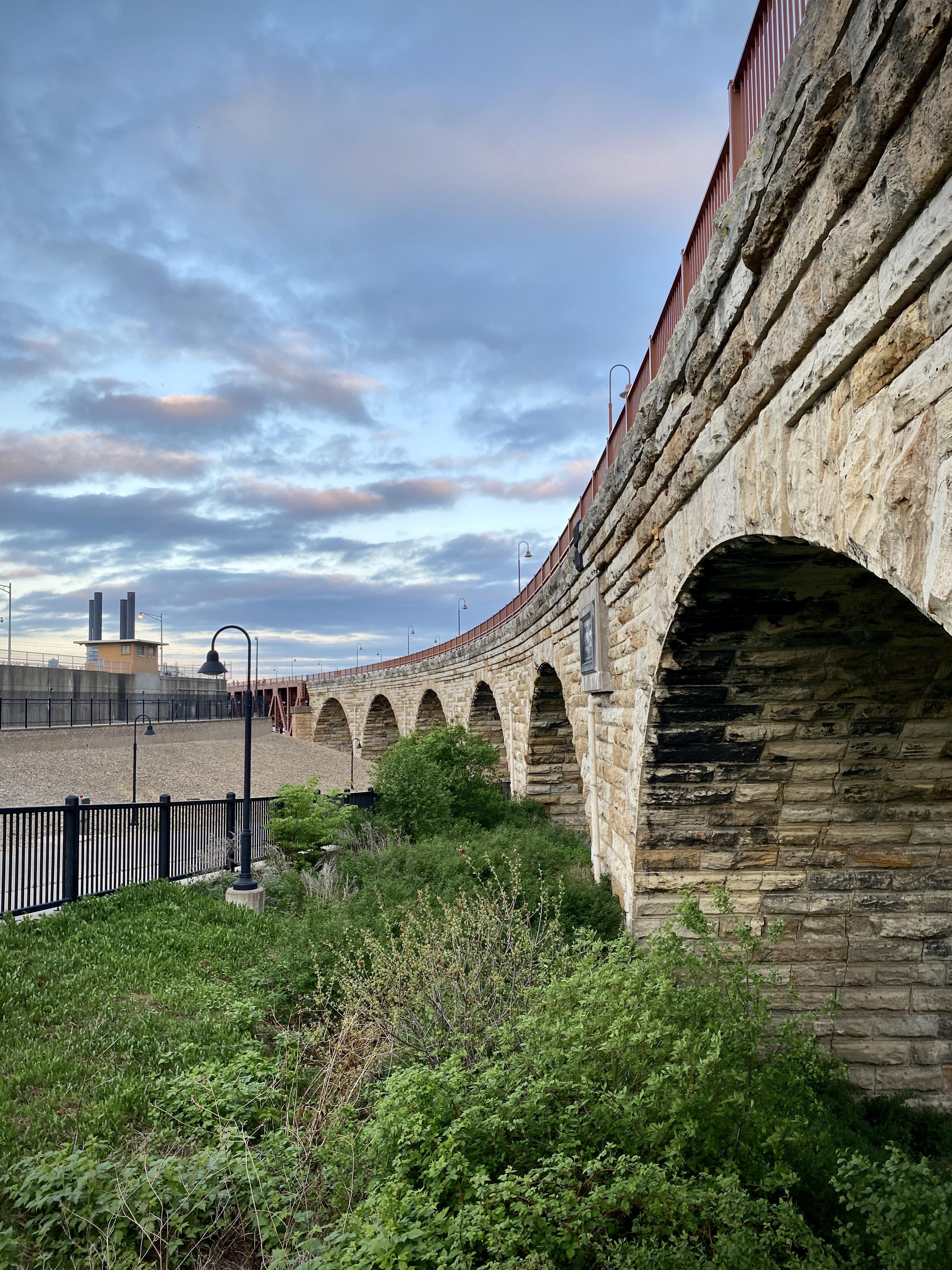 Stone Arch Bridge at dusk. | Scrolller