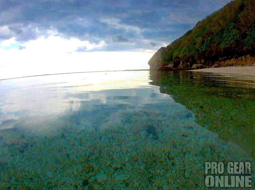 Storms over an oceanic lagoon | Scrolller