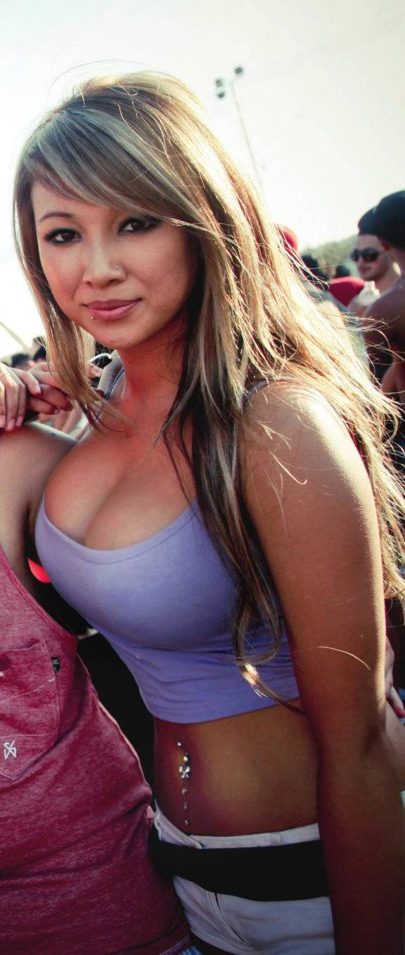 Stretching out her top | Scrolller