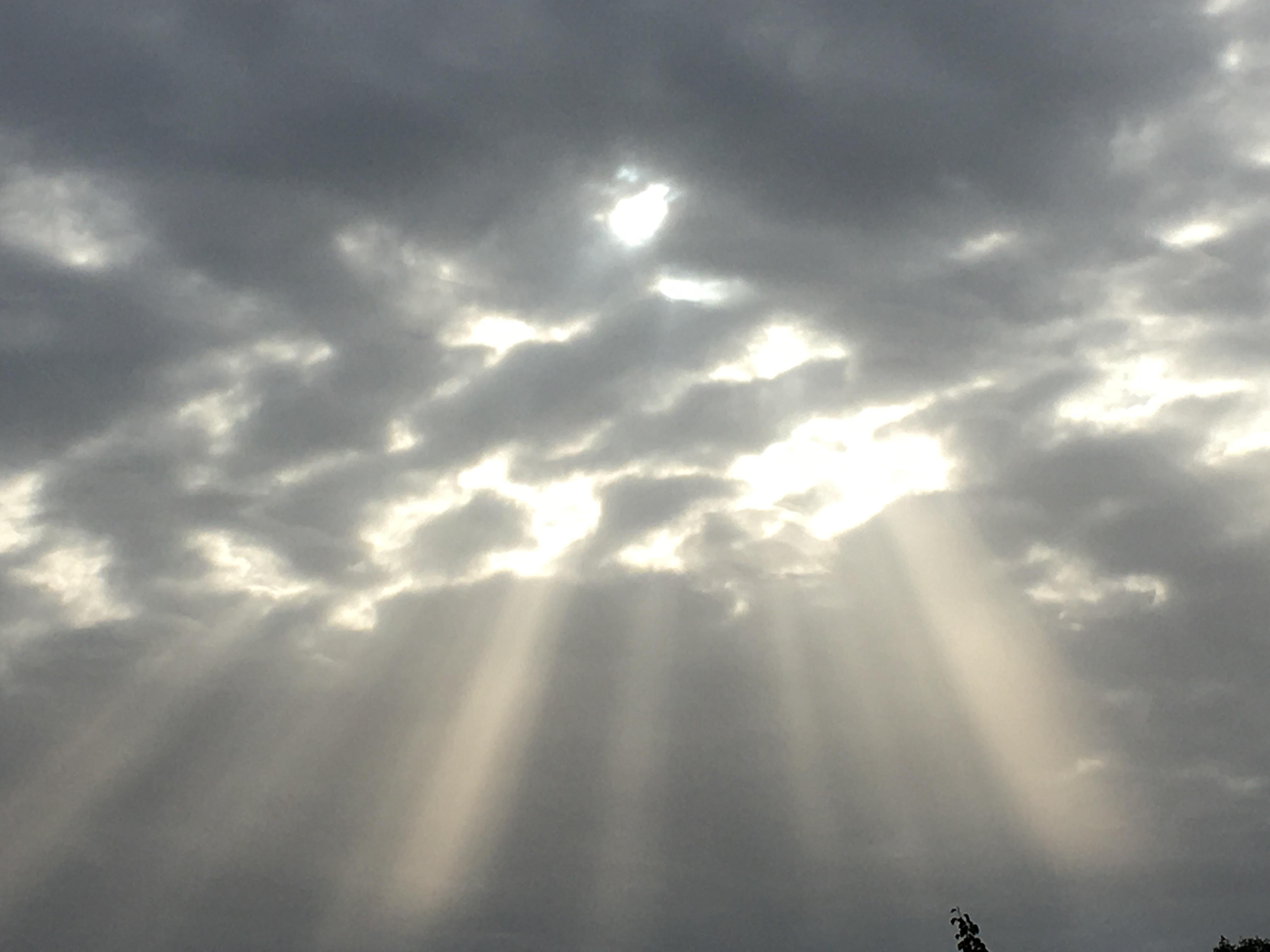 Sun breaking through the clouds | Scrolller