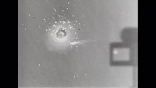 Surfaced U-Boat straddled by bombs | Scrolller