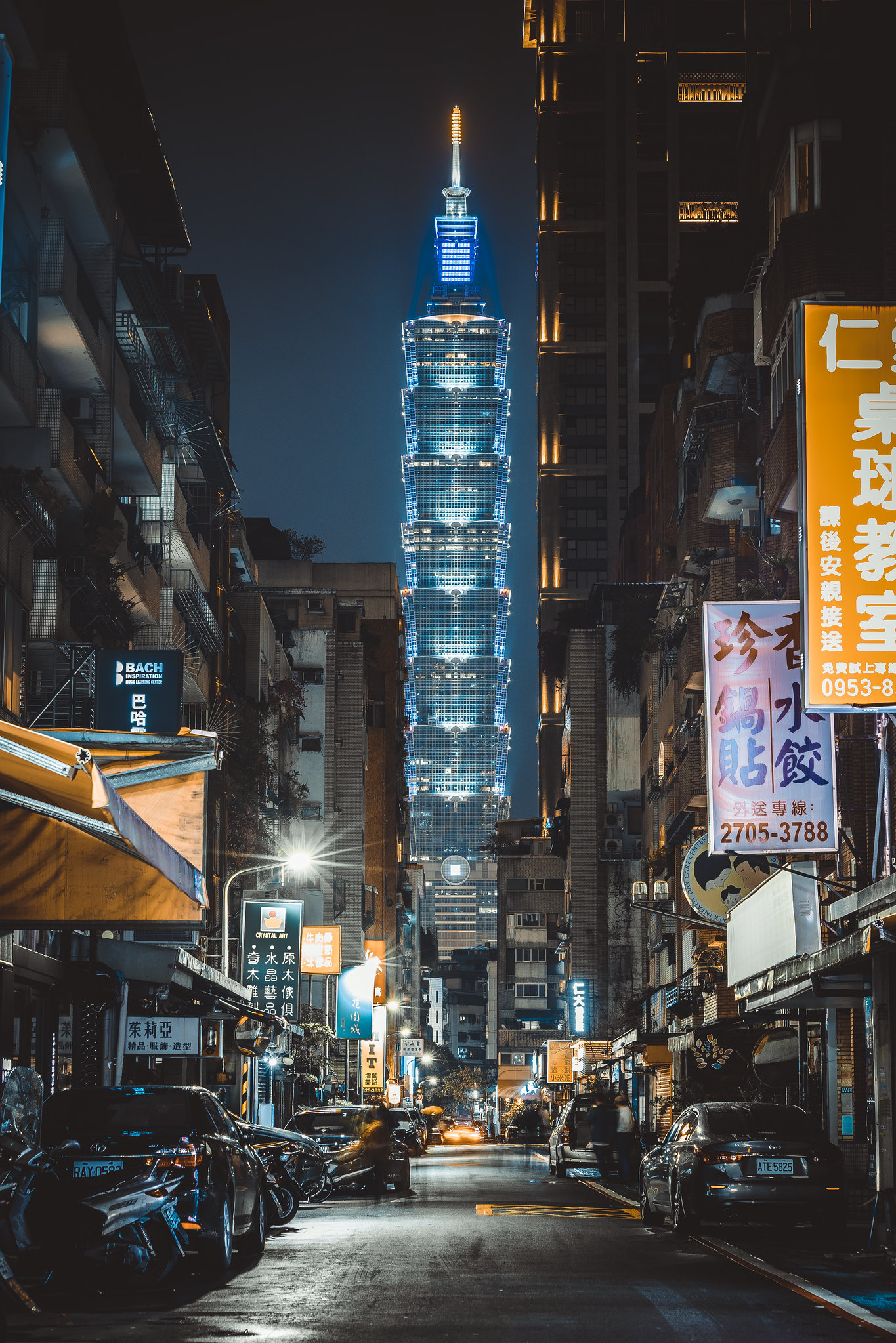 Taipei 101 rising over the high-rise streets of Taipei, Taiwan [1365×2047] | Scrolller