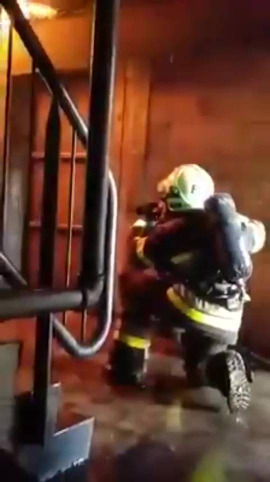 Technique used by firefighters to protect against sudden flares or firestorm. | Scrolller