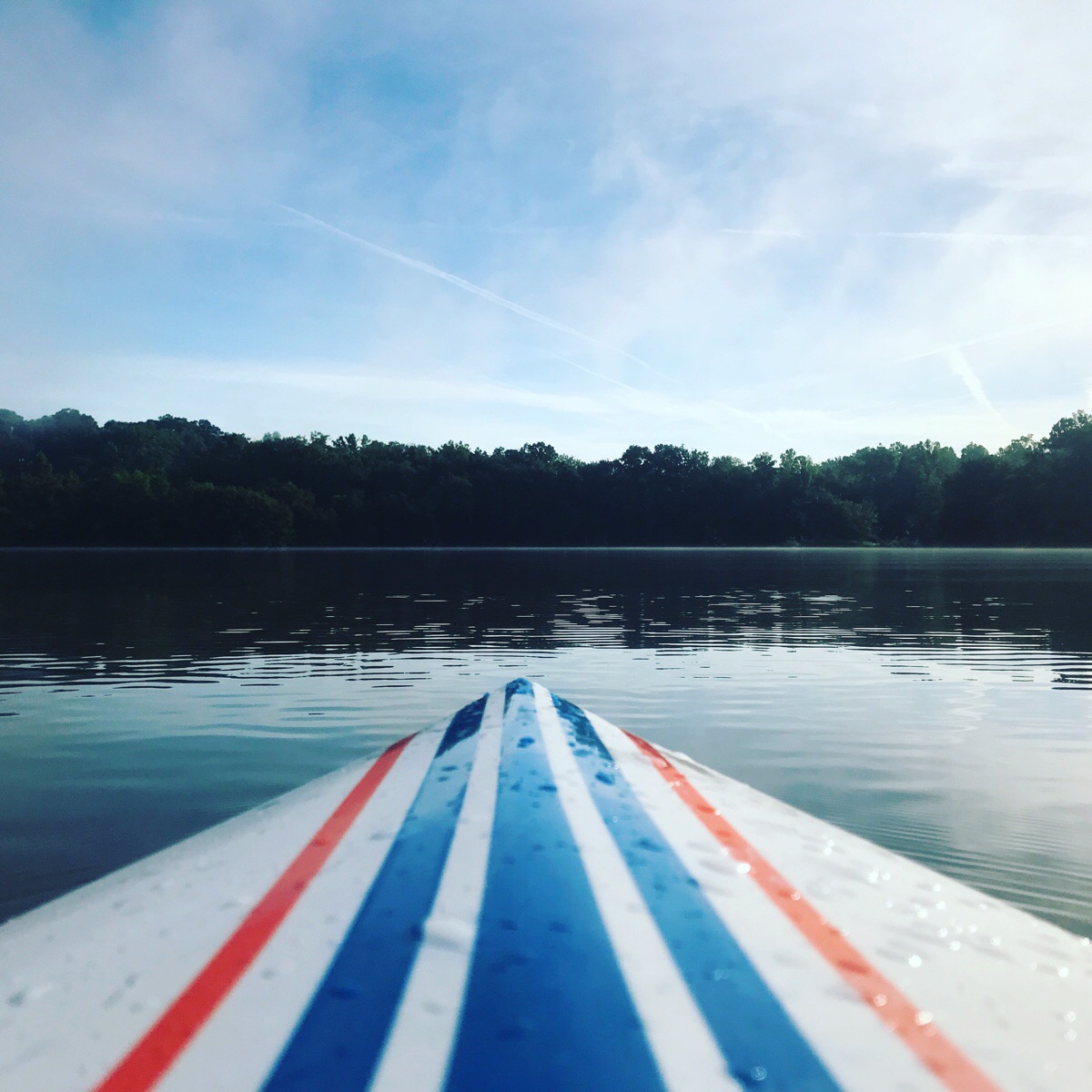 The conditions on the lake were perfect this morning for some sun salutations. | Scrolller