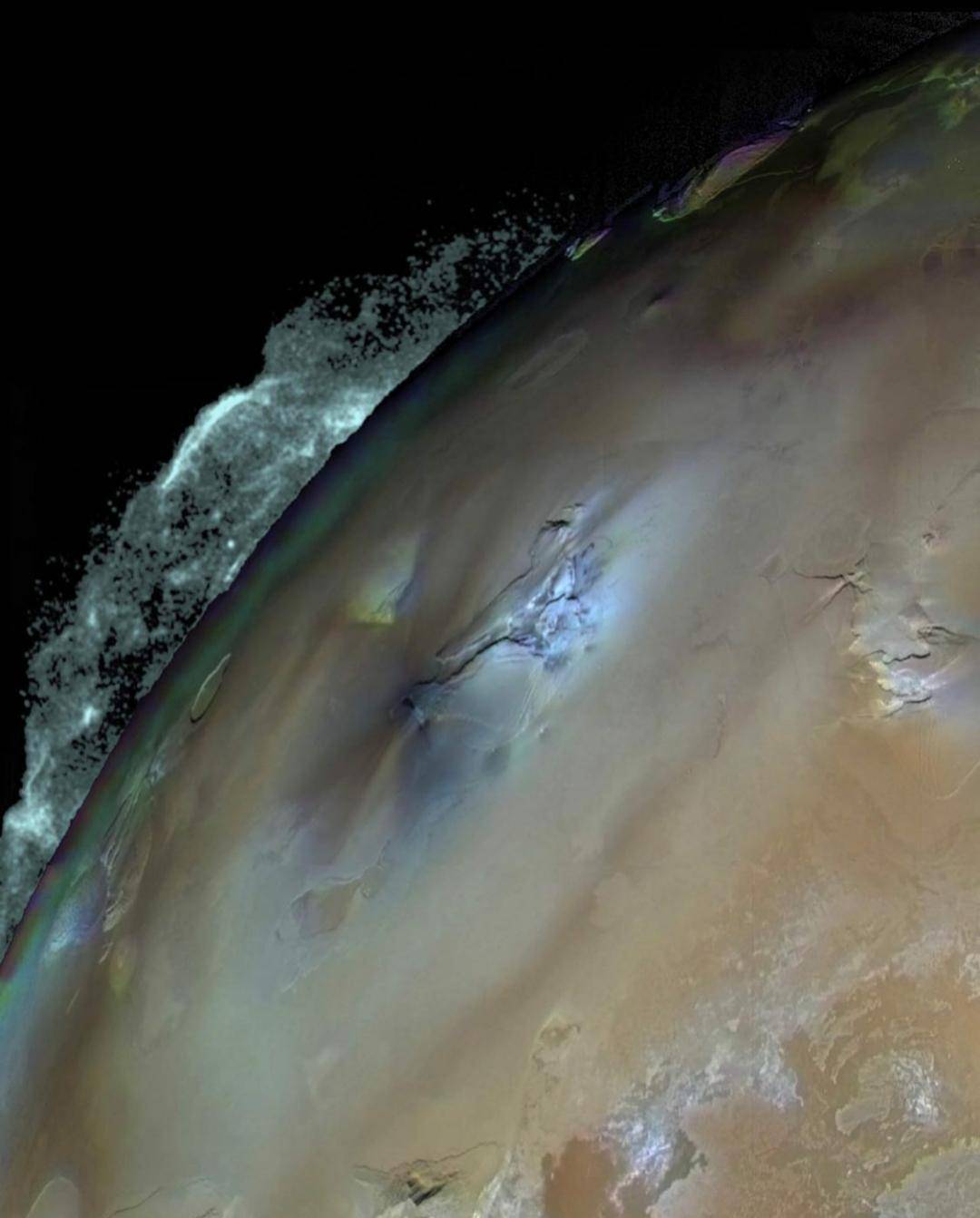 The eruption of volcano on Jupiter's moon Io, captured by Voyager 1. | Scrolller