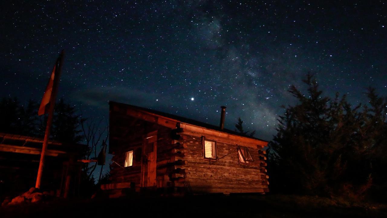 The Woodland Escape - Authentic 1700's Trapper Cabin | Scrolller