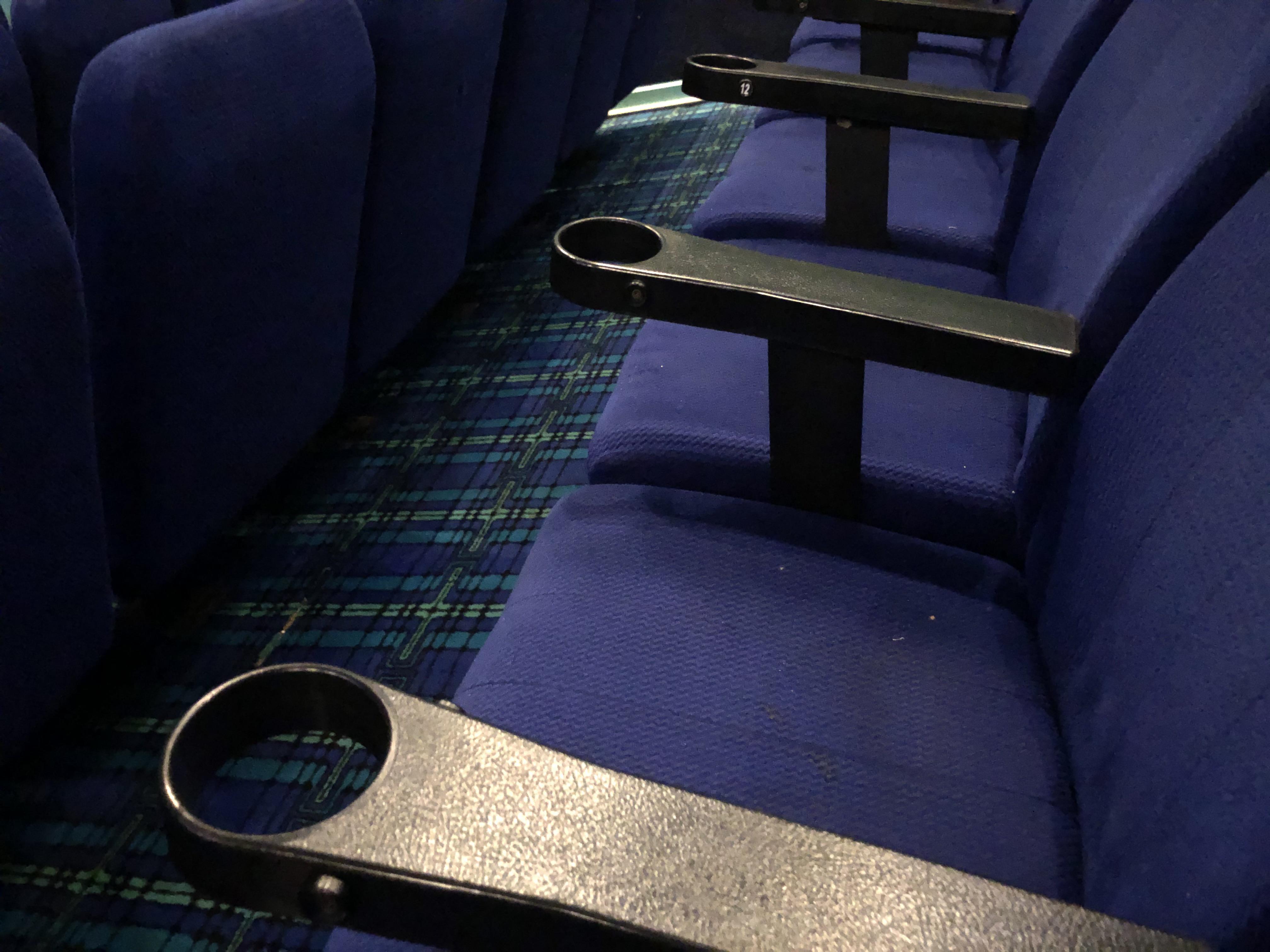These cinema cup holders with no bottoms so they only fit their super ...