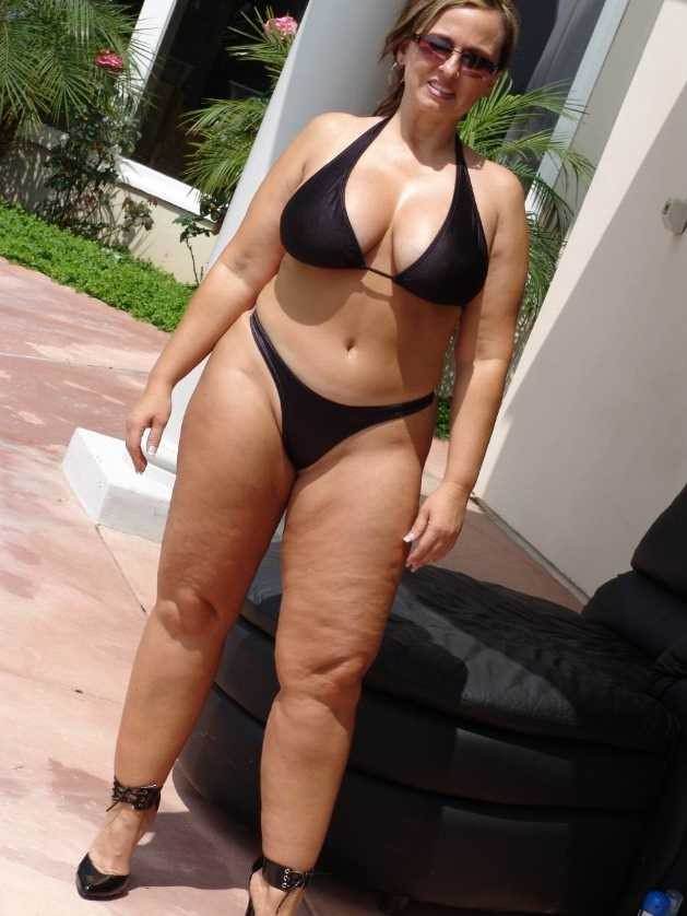 Thick MILF in heels and a black bikini | Scrolller