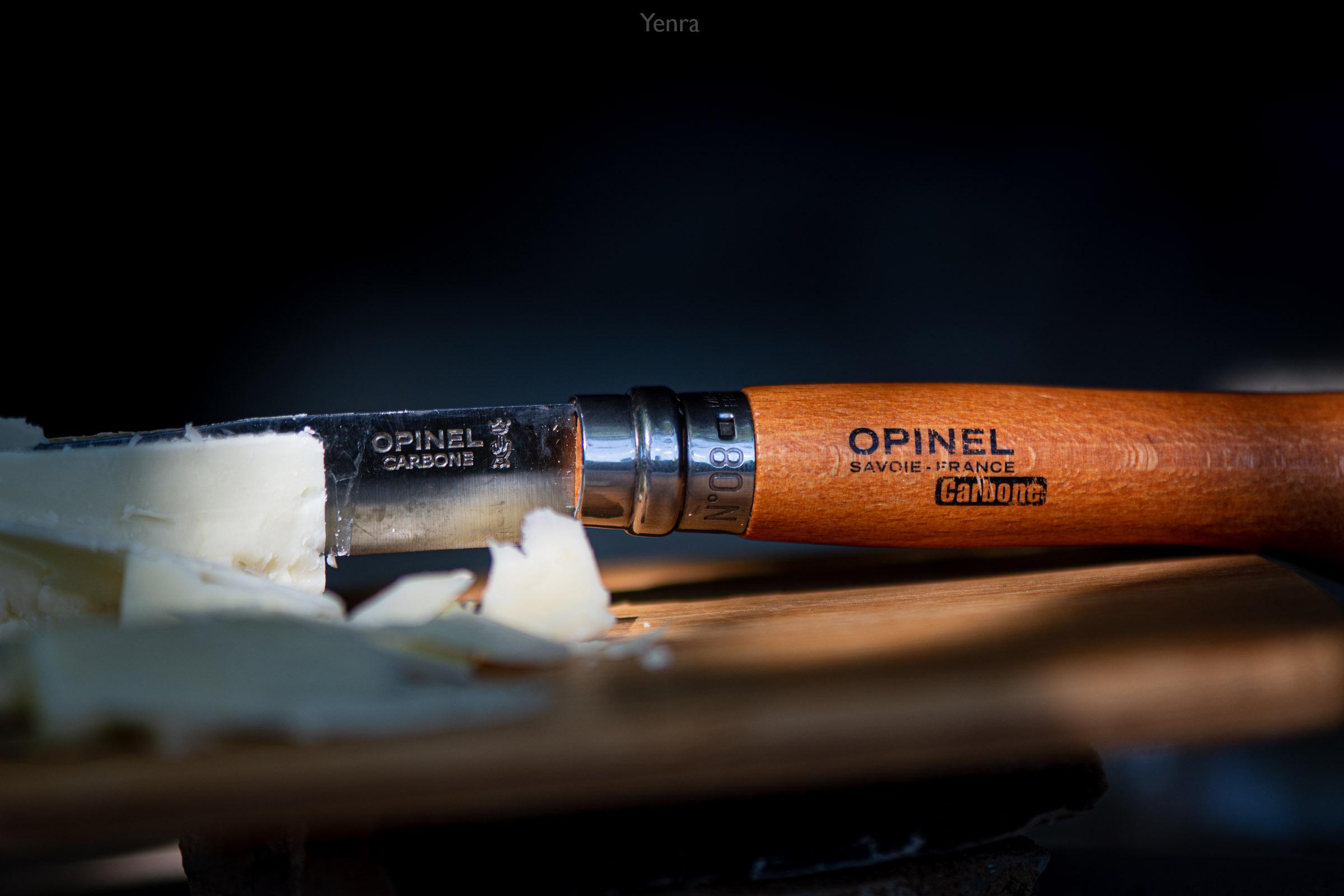 Thin slicing sharp cheddar with Opinel 8. | Scrolller