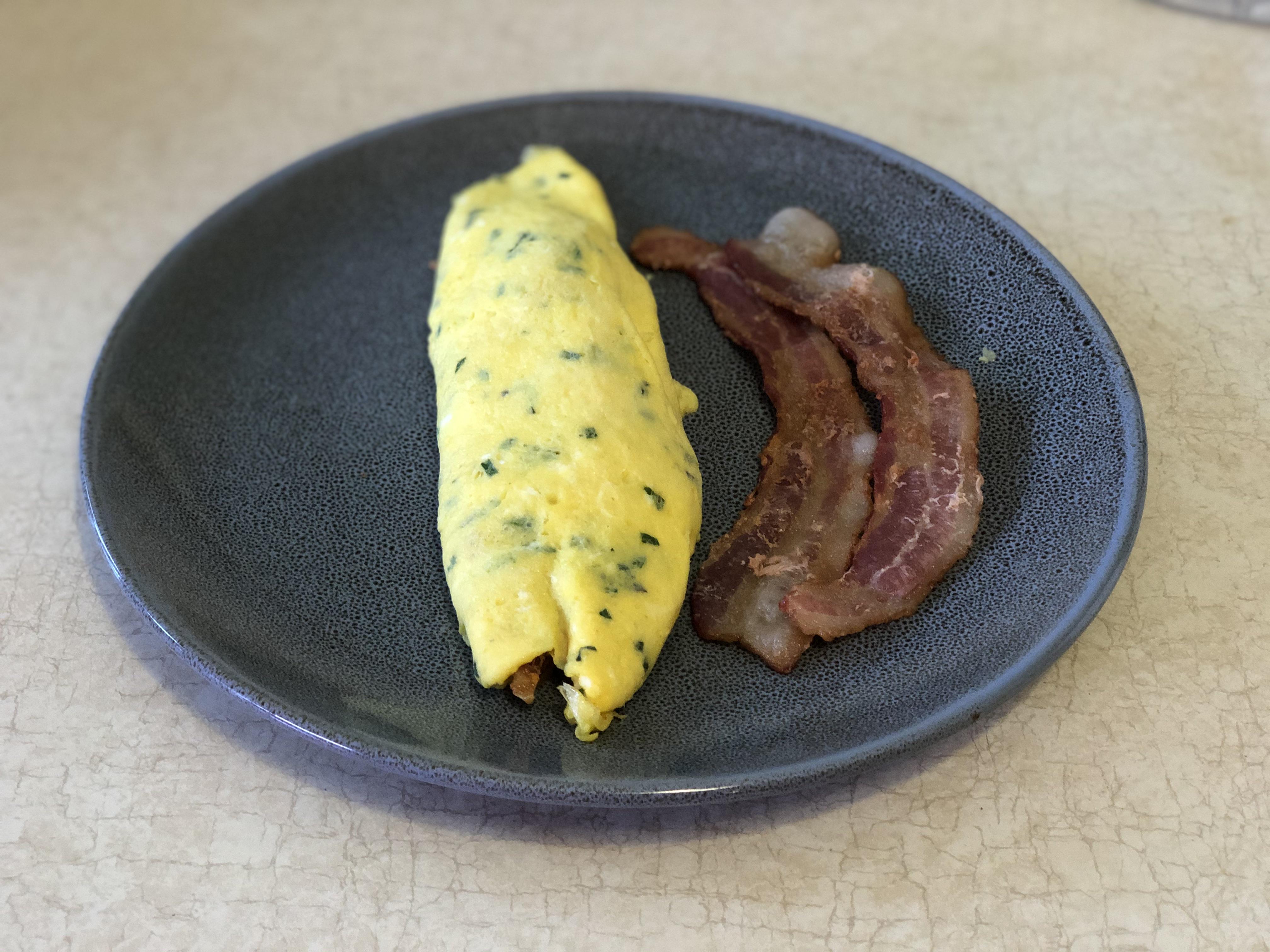 Third attempt at a classic French omelet. I think it came out pretty well. | Scrolller
