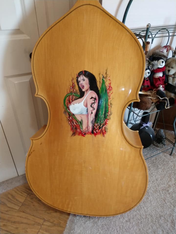 This badass bass, painted by the multi-talented guitar player for Mama's Hot Sauce. | Scrolller